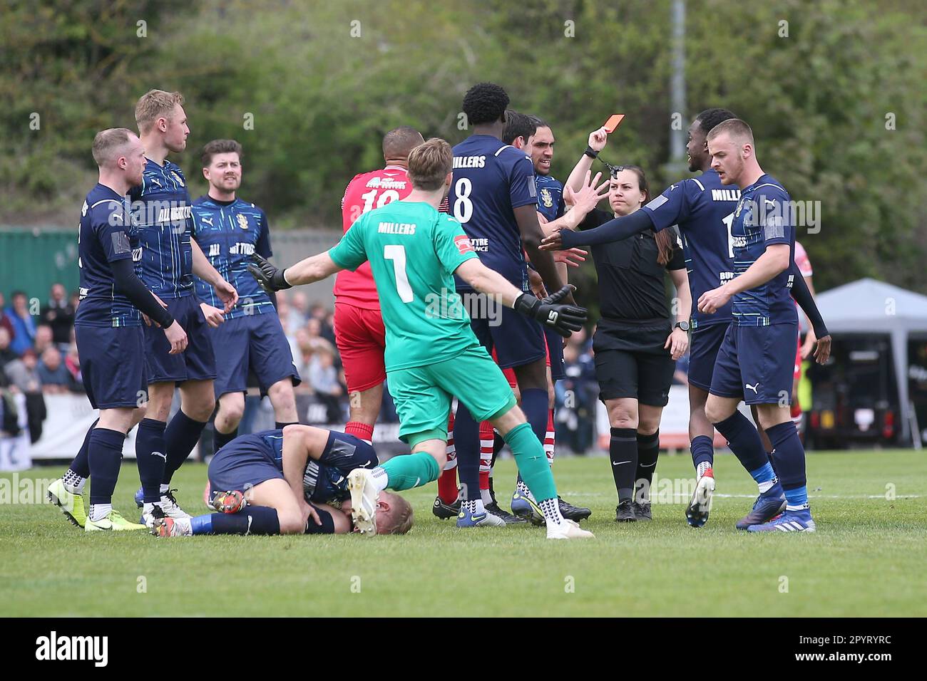 Lewwis Spence of Hornchurch is shown a red card and sent off by referee ...