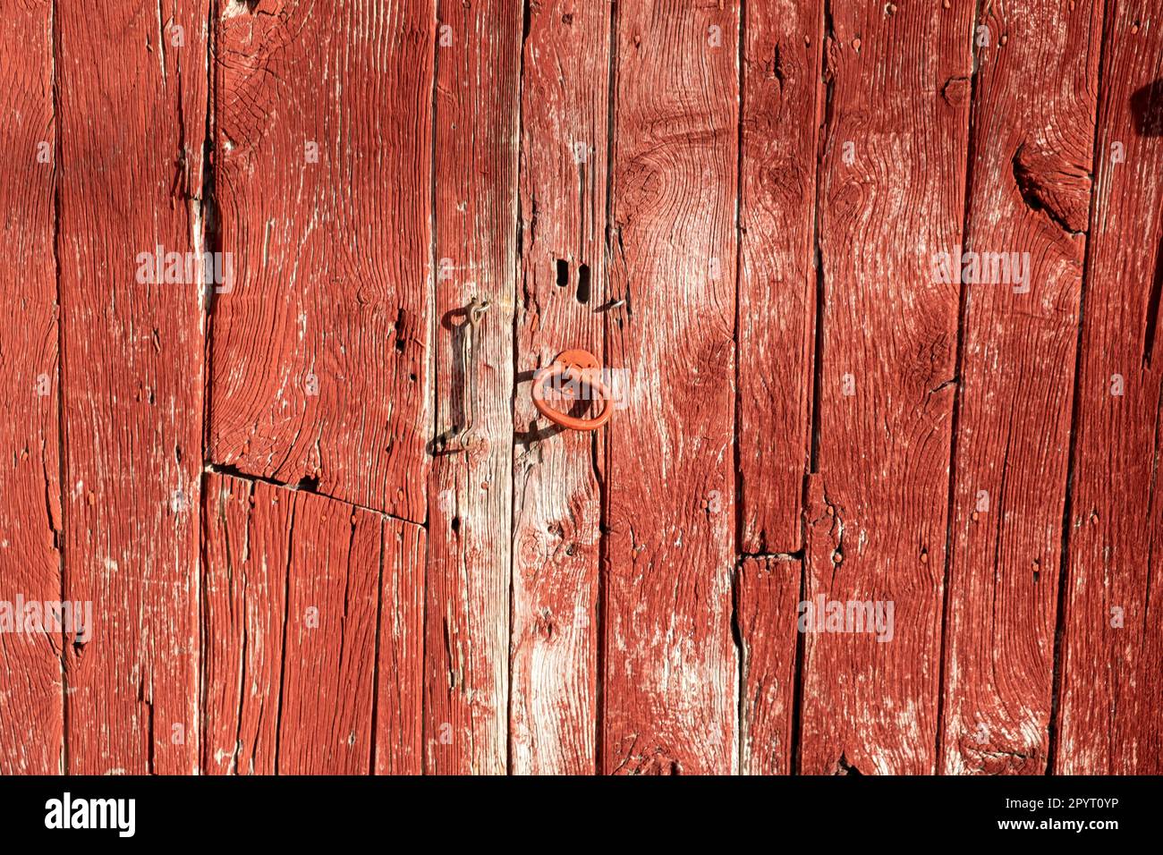 detail of the texture of an antique wooden door painted red Stock Photo ...