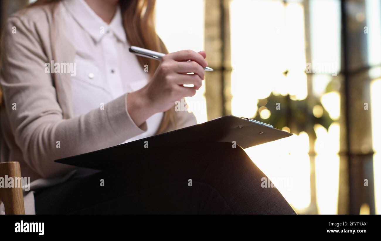 woman fill in information in questionnaire making application for hire ...
