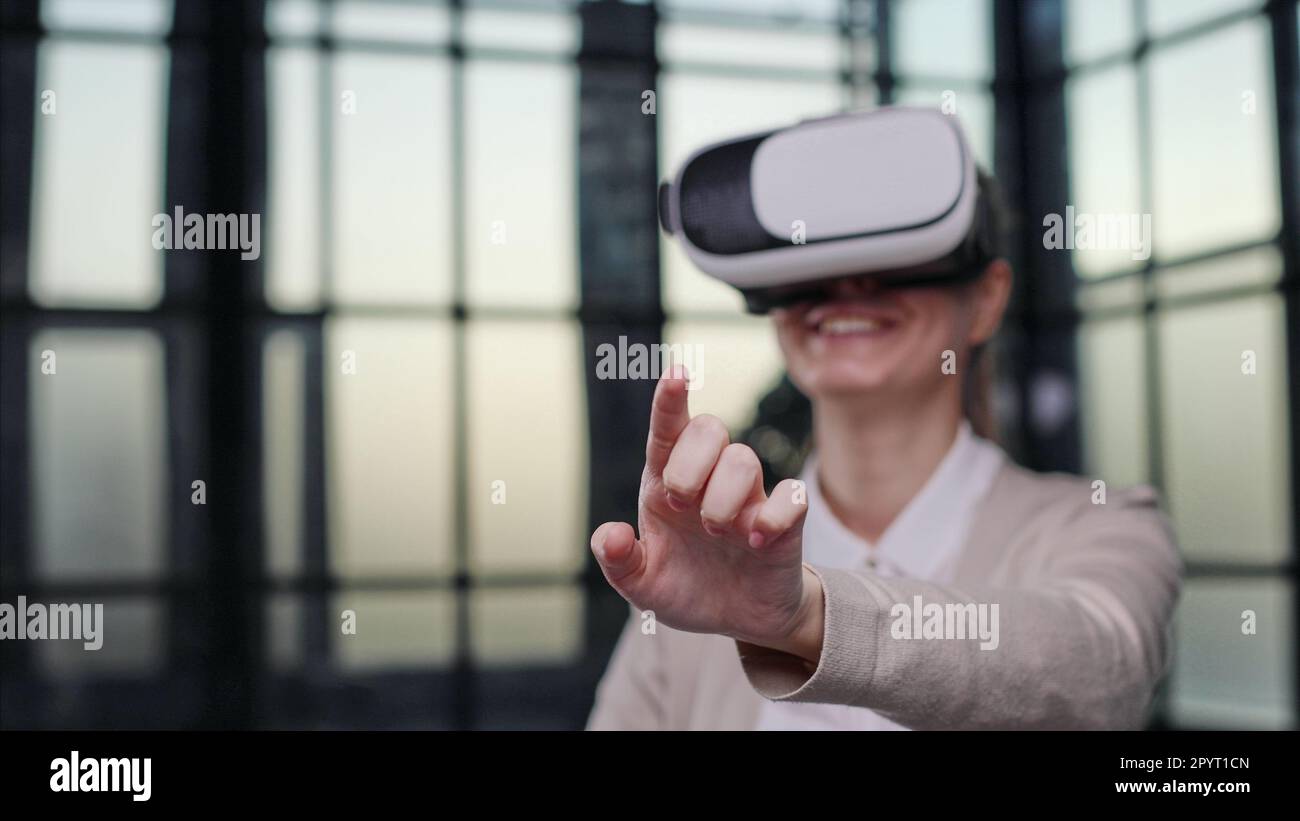 Woman having fun using virtual hi-res stock photography and images - Alamy