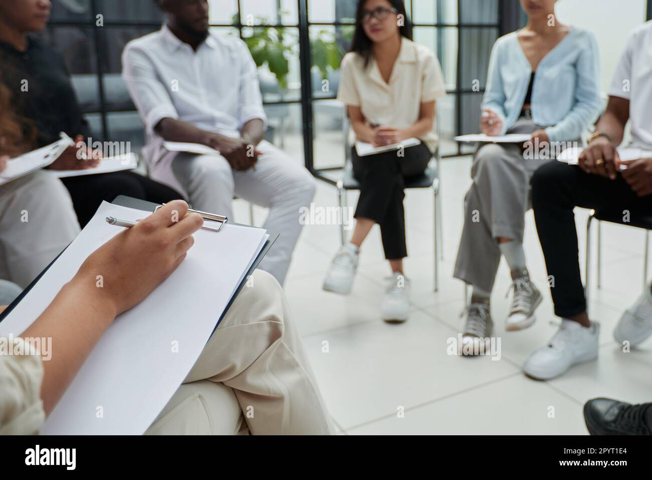 Trainees attending a business team training in a co working space ... Trainees attending a business team training in a co working space ...