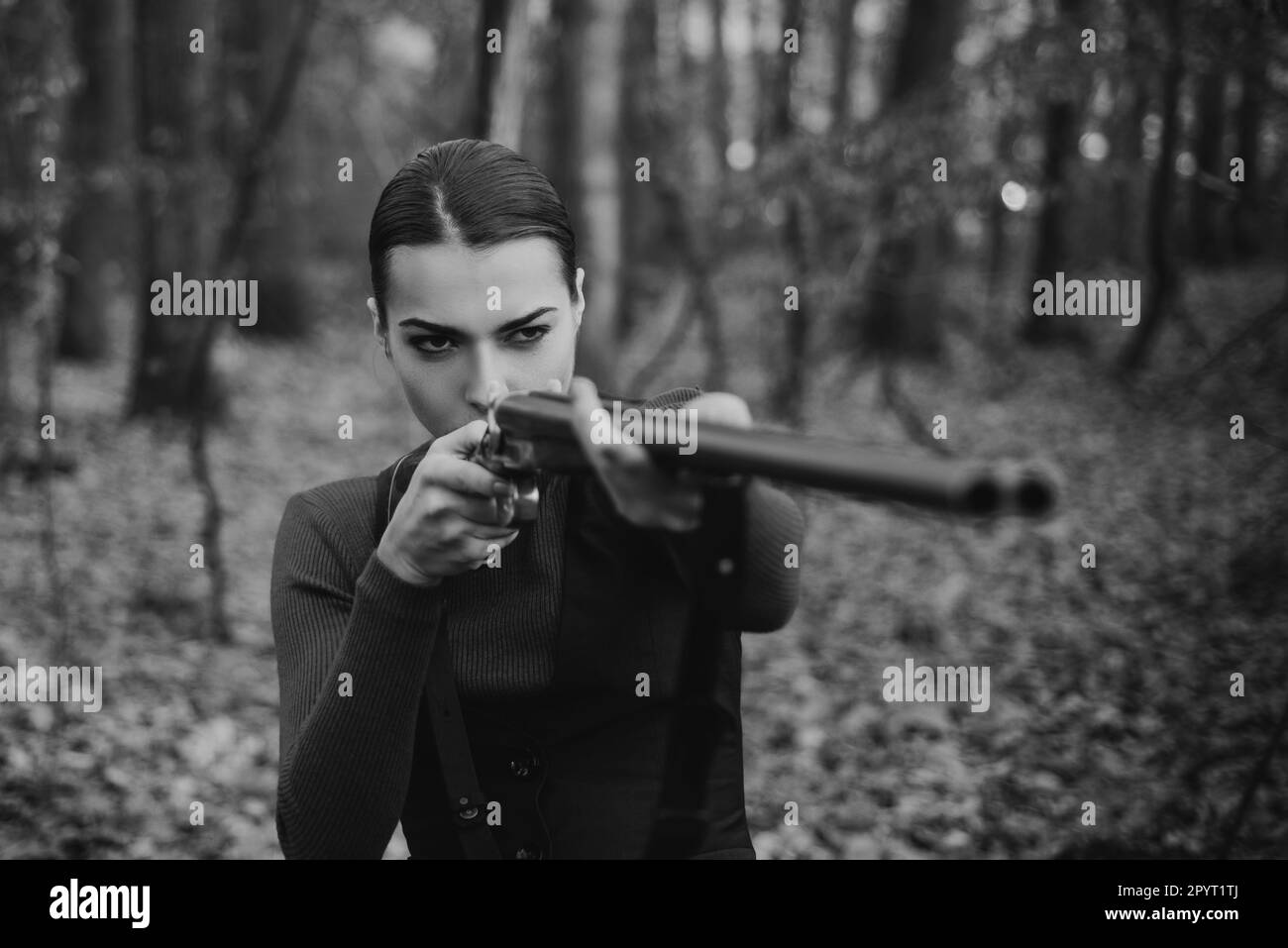 Hunter woman with shotgun on hunt. Hunting in forest. Portrait of woman ...