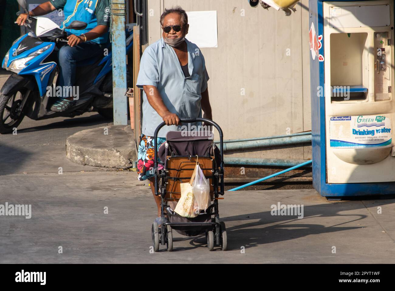 Senior pushing baby carriage hi-res stock photography and images - Alamy