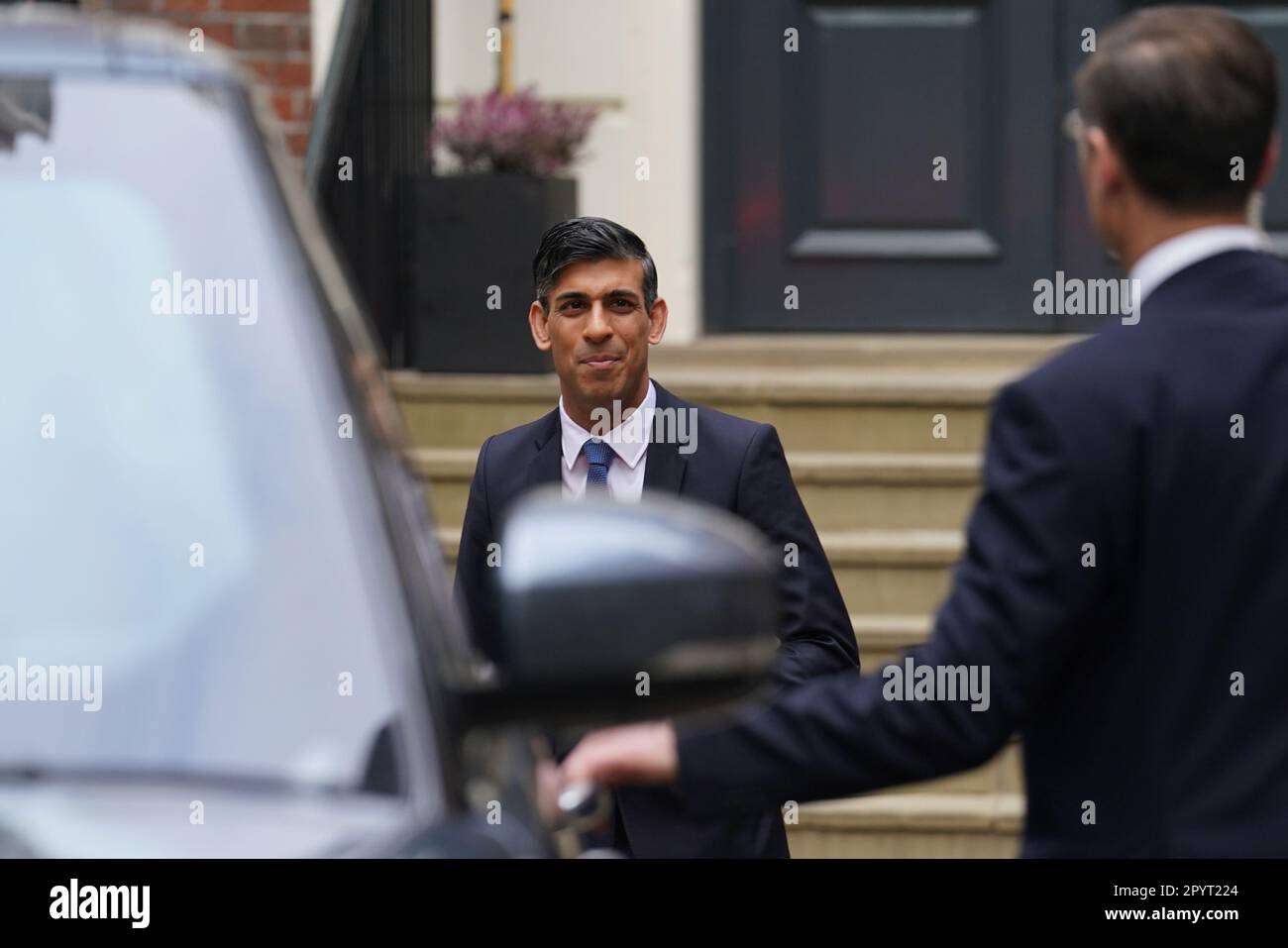 Prime Minister Rishi Sunak leaves the Conservative Party headquarters ...