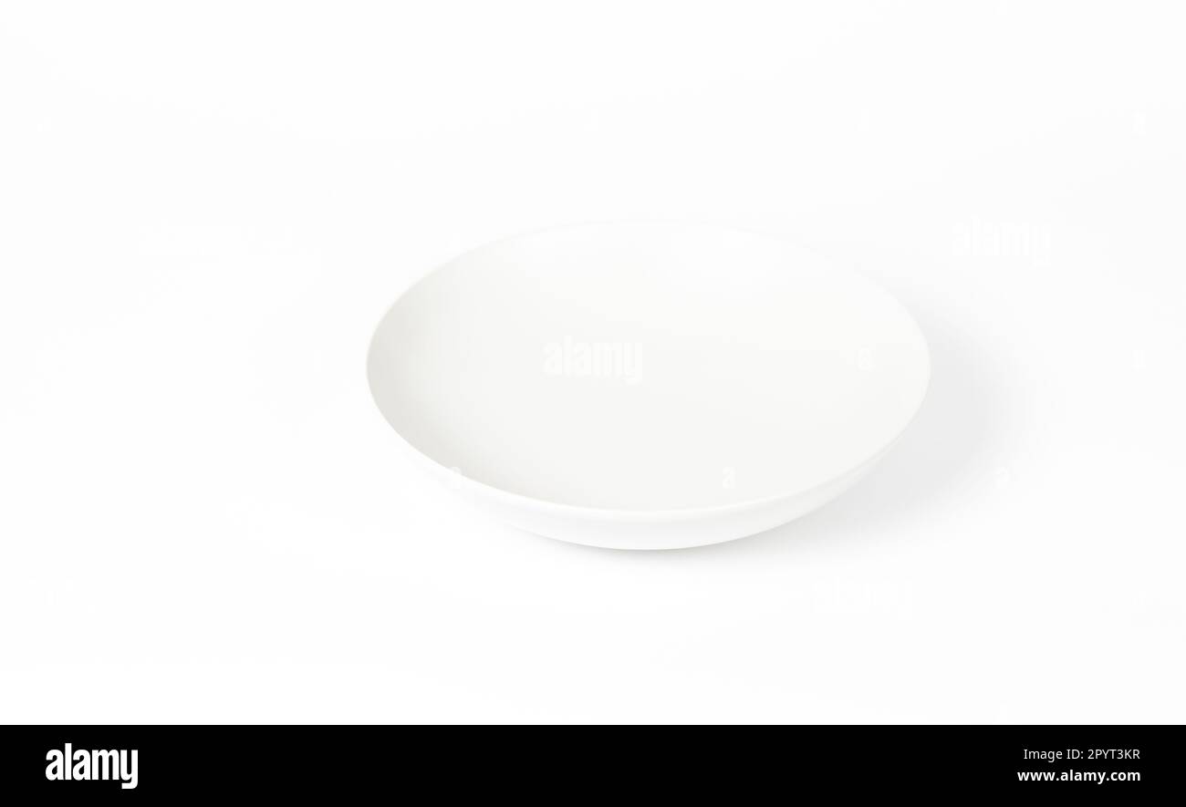 White plate on white background. Space for text, for advertising ...