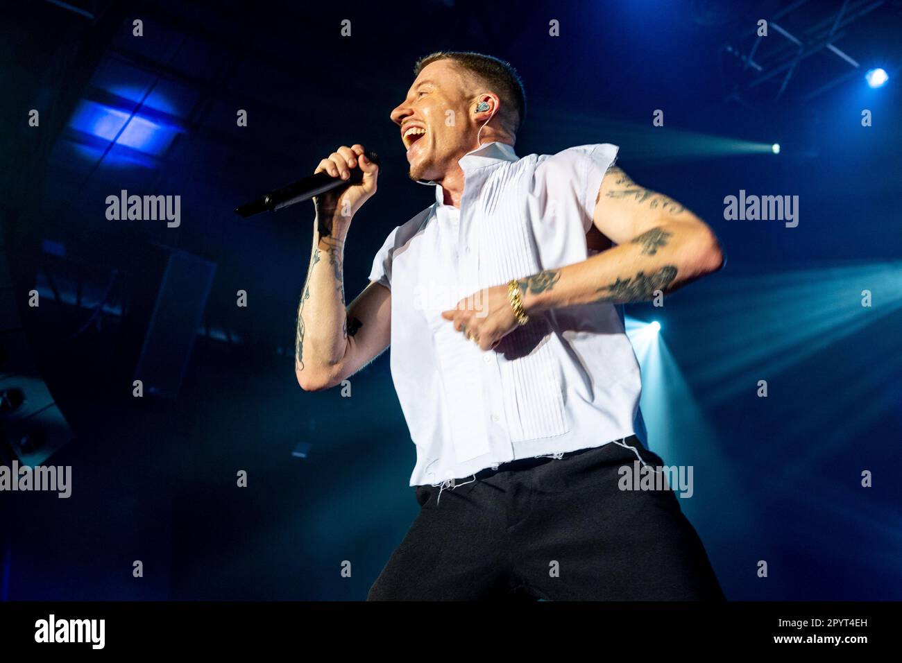 Macklemore in concert Stock Photo - Alamy