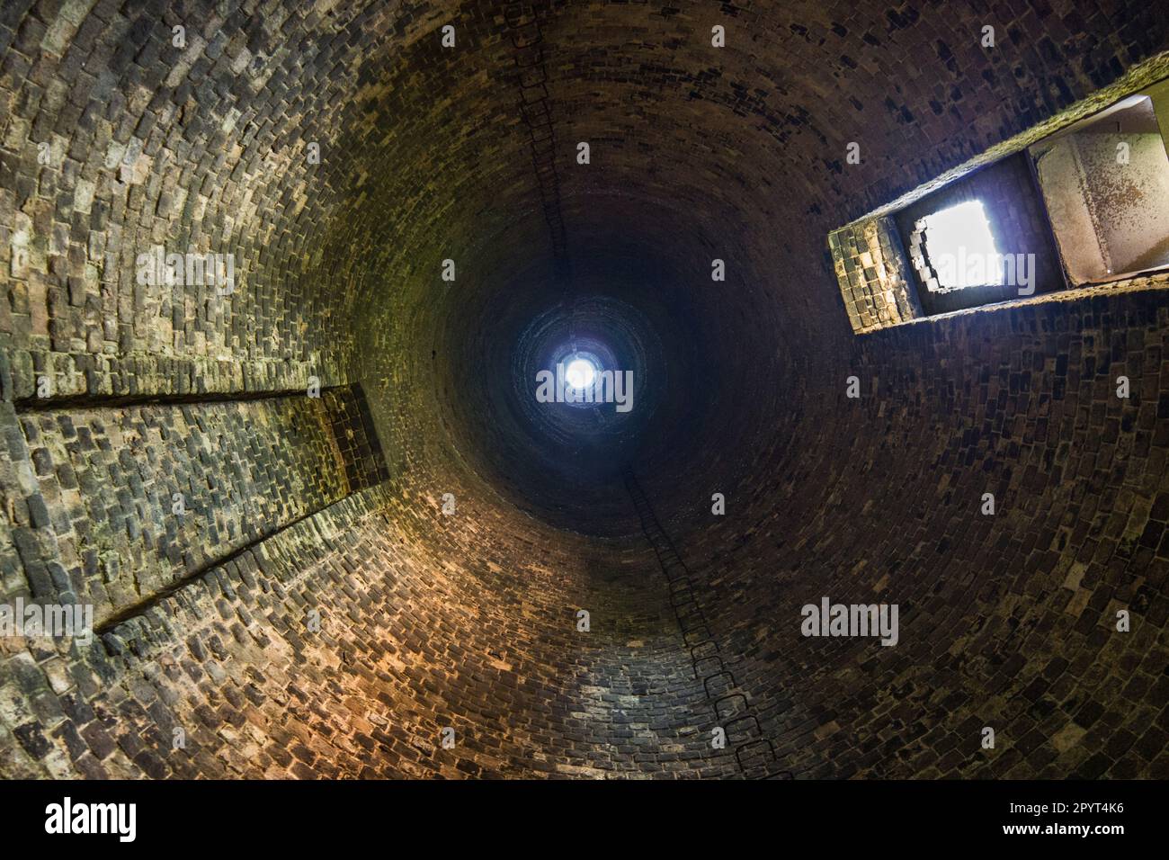 The inside of an old chimney -former Elektrosvit plant Stock Photo - Alamy