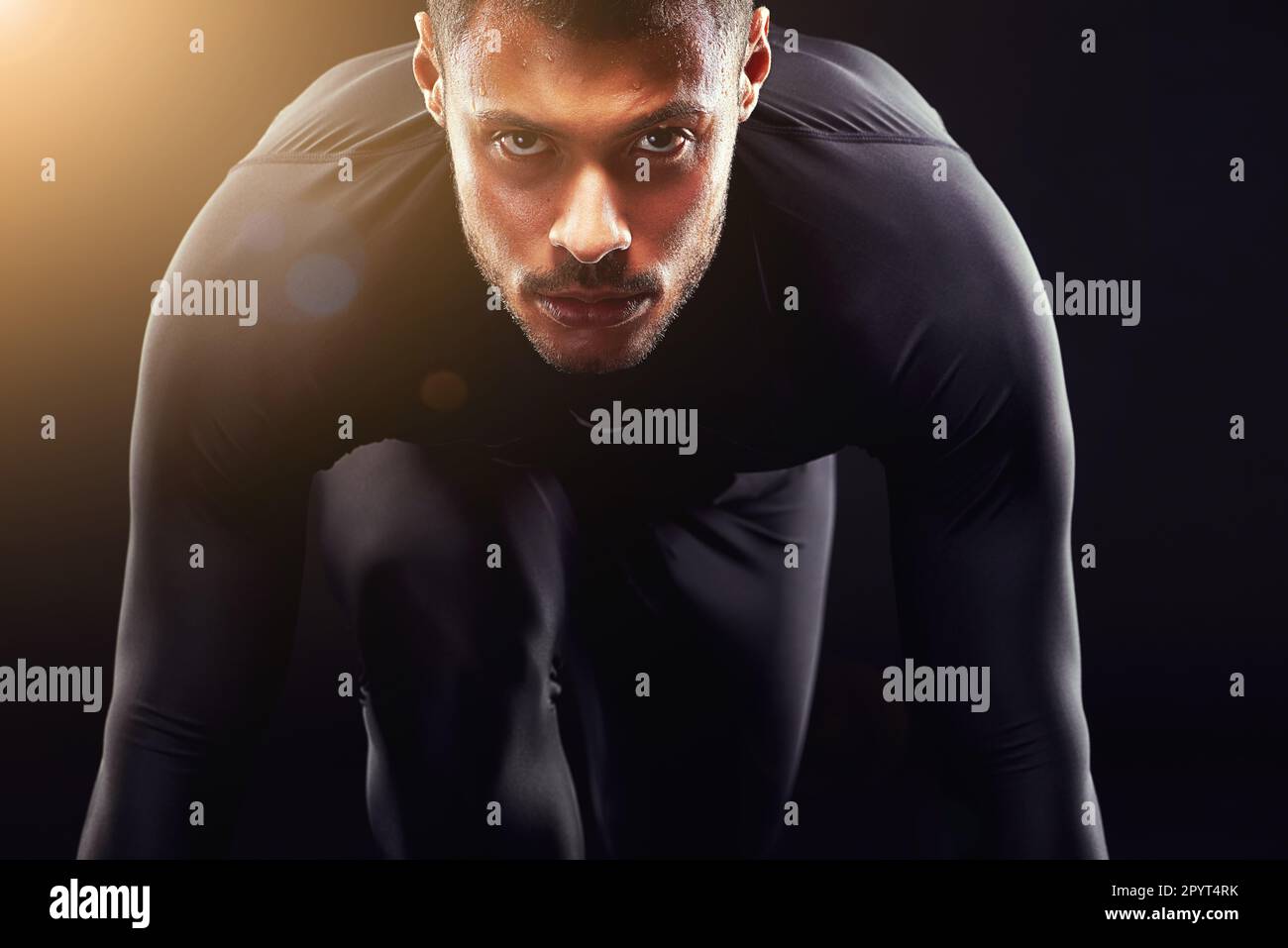 Runner man, start and isolated portrait or run, race and intense focus ...