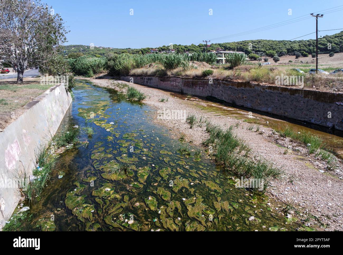 Dirty river in Rafina city in Greece Stock Photo - Alamy