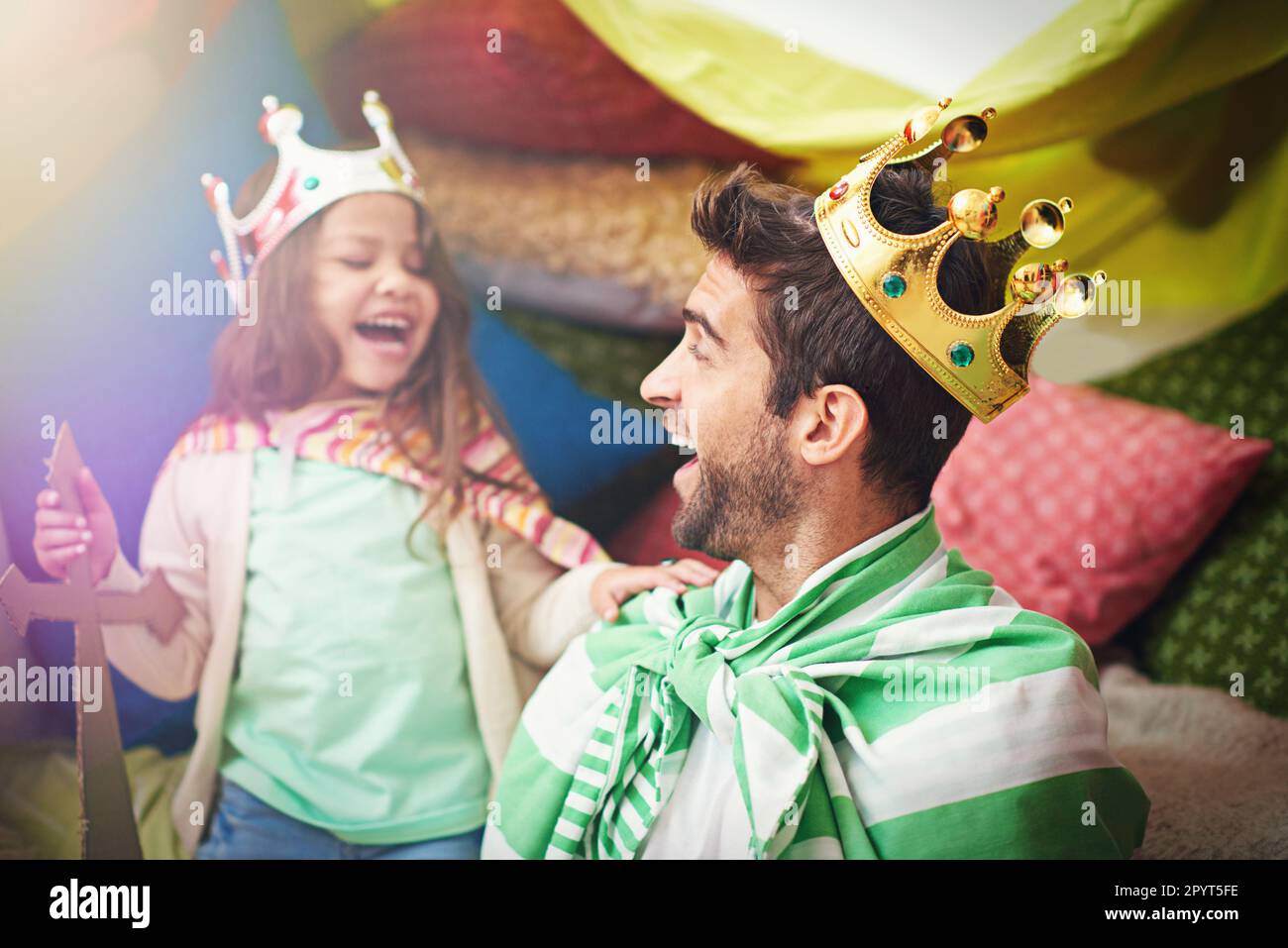 Fantasy, child dress up and dad with princess fun in a bedroom fort ...