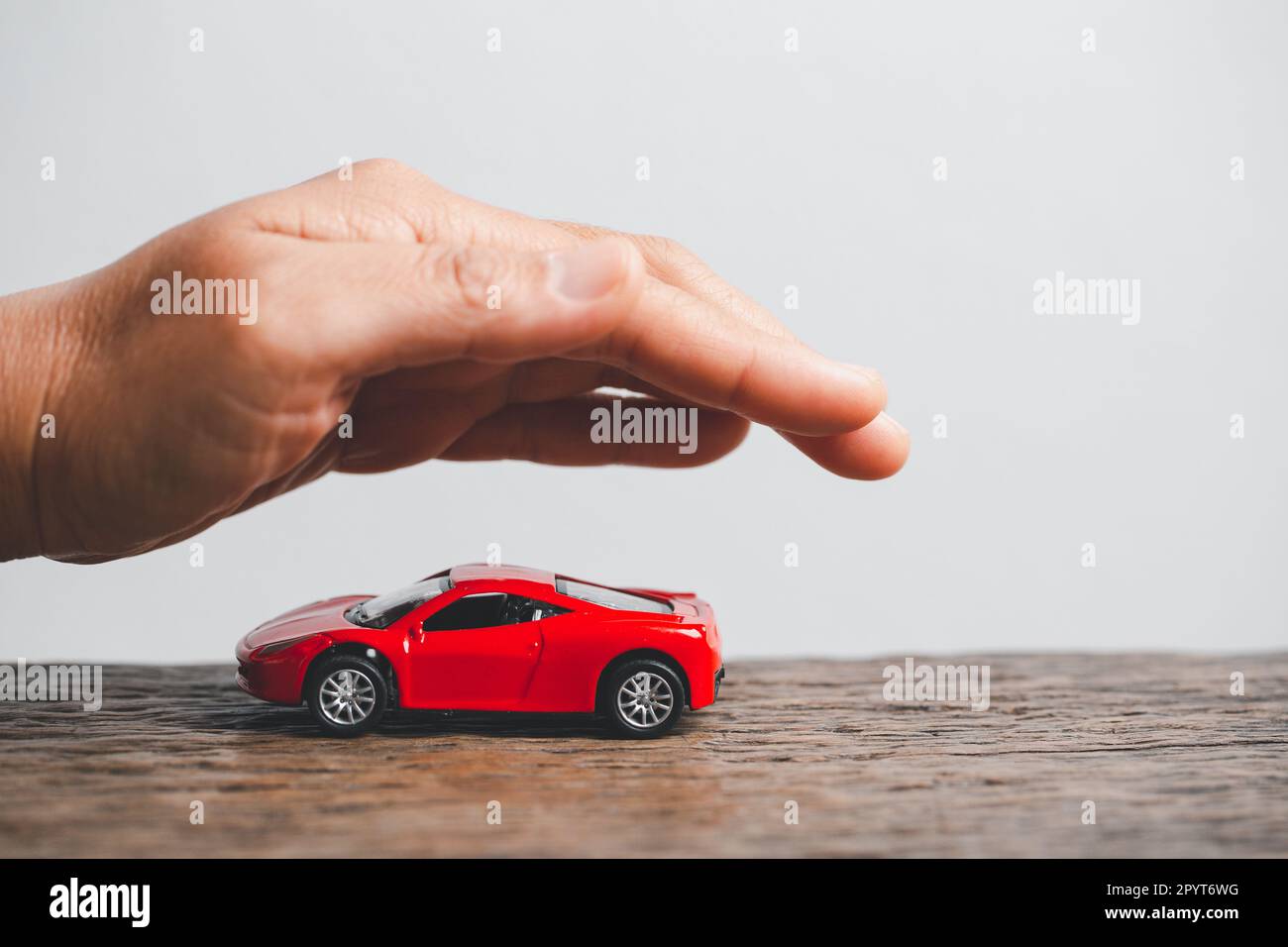 Female hands and car as protection of car concept. Woman insurance ...