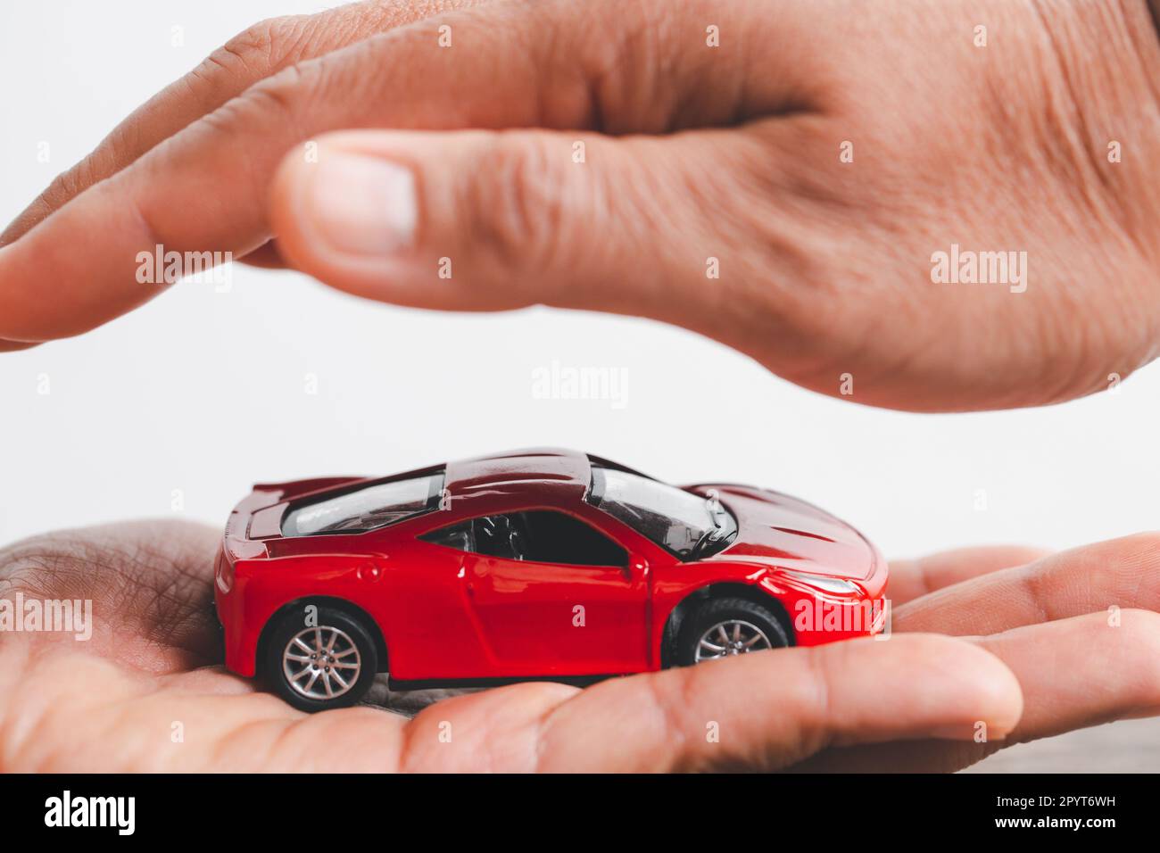 Female hands and car as protection of car concept. Woman insurance ...