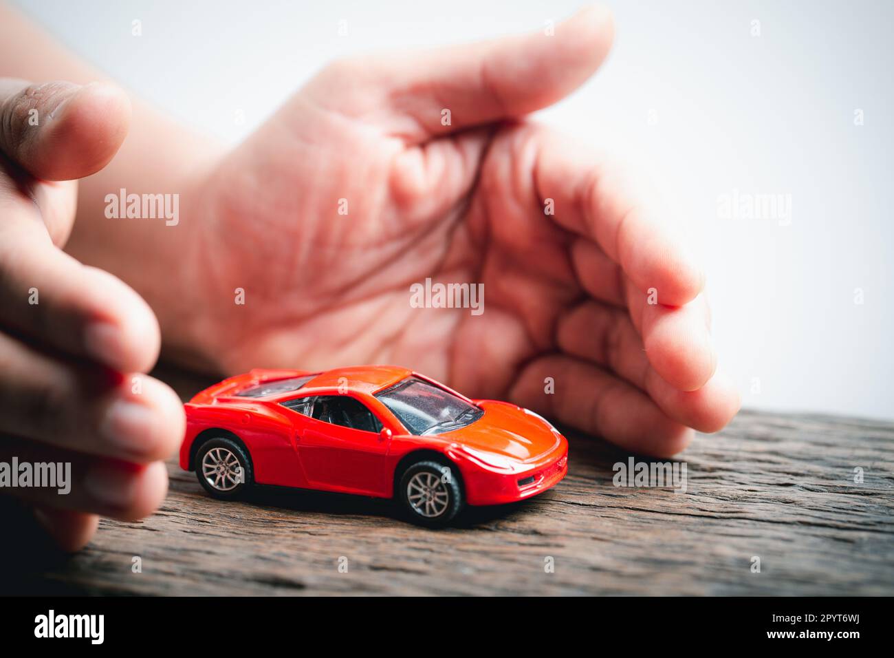 Female hands and car as protection of car concept. Woman insurance ...