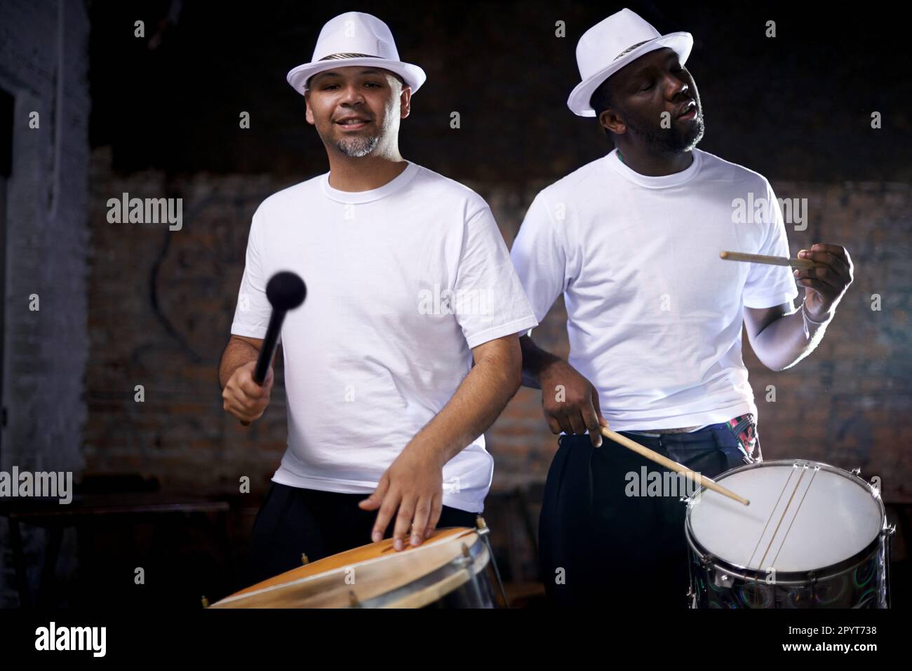 Feel the rhythm of the carnival. Portrait of a band playing their ...
