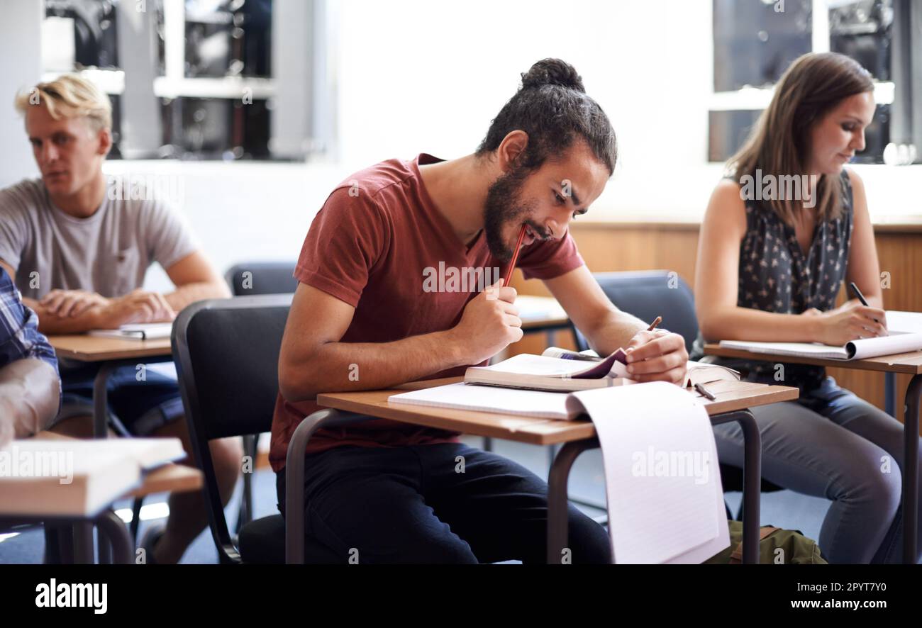 Multiethnic students writing test hi-res stock photography and images ...