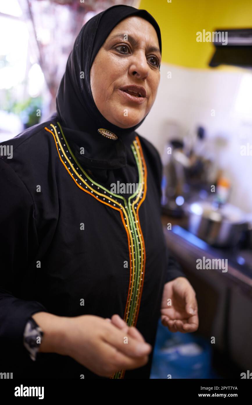 My kitchen is where i do my best work. a mature muslim woman in her ...