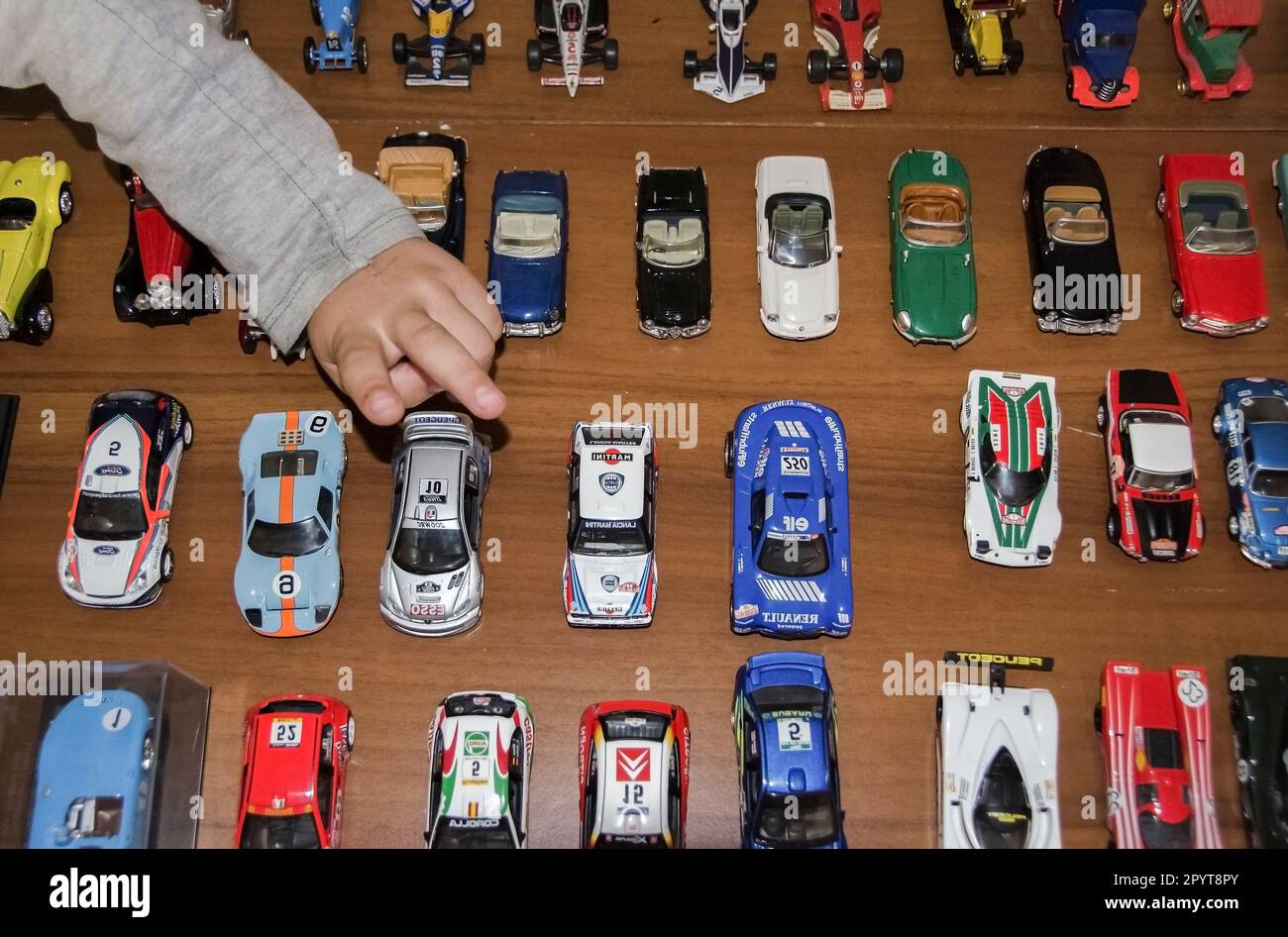 Boy's collection of miniature cars Stock Photo - Alamy