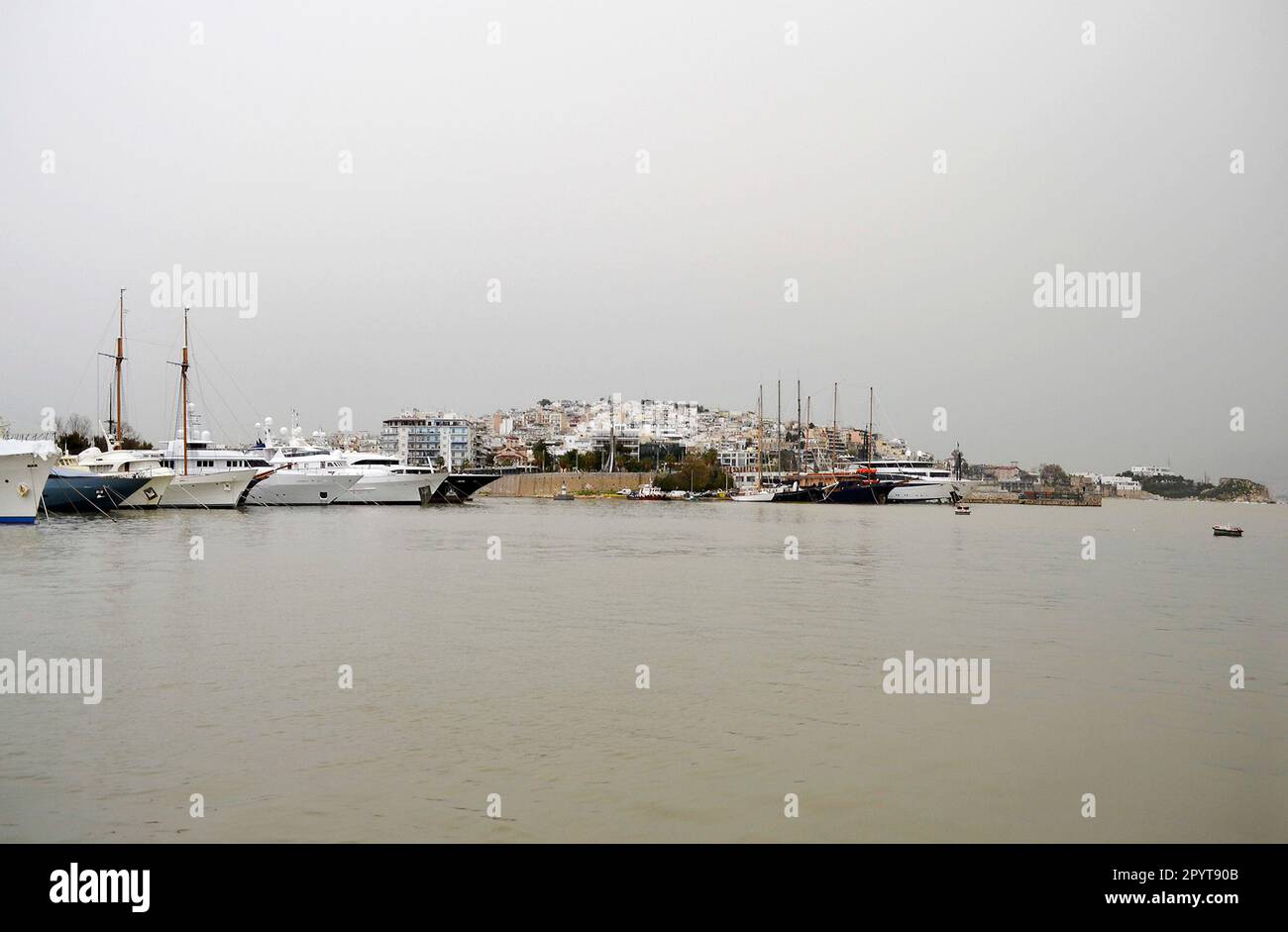 Misty rainy mud day on Pasalimani and Kastela in Piraeus city. Greece ...