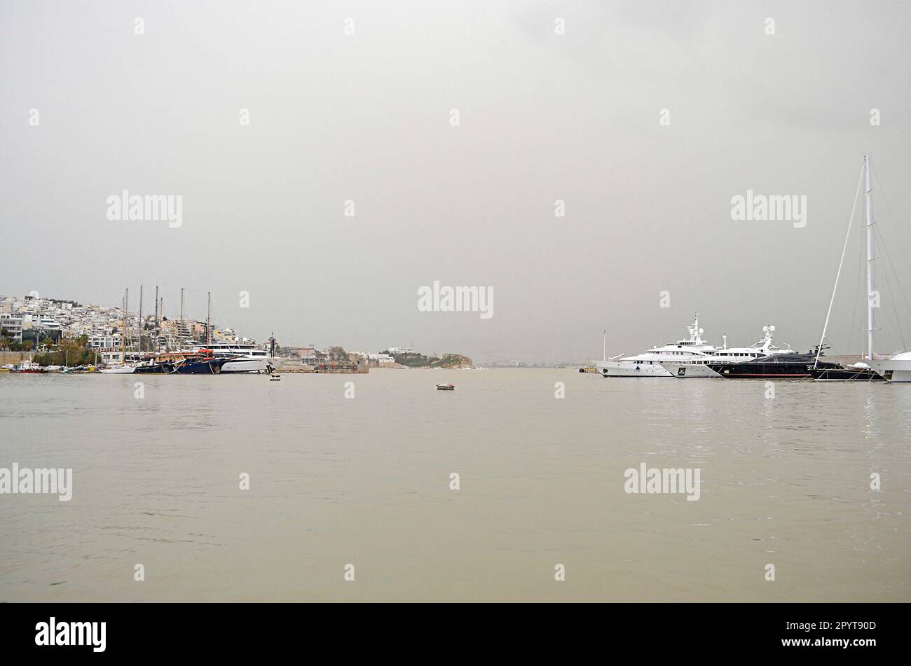 Misty rainy mud day on Pasalimani and Kastela in Piraeus city. Greece ...