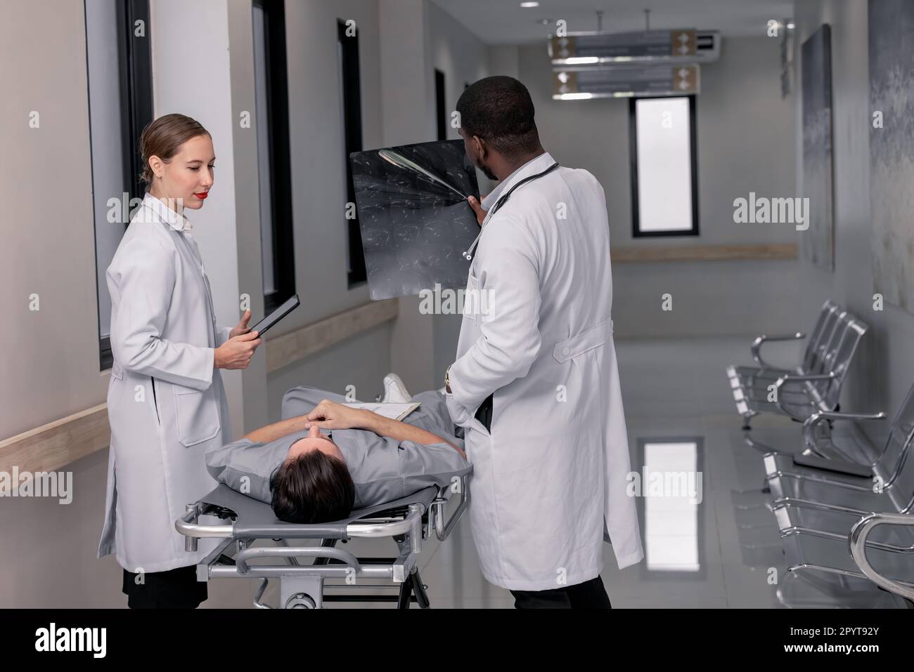 Physician and radiologist analyze medical images, including MRI film ...