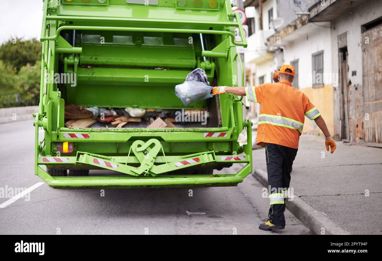 Waste, truck and man with garbage, collection and recycling in the ...