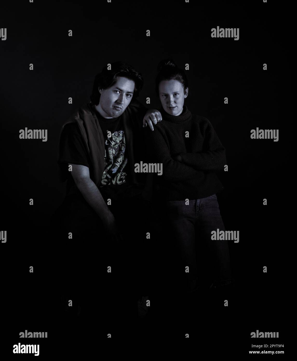 Portrait of two people in a studio Stock Photo - Alamy