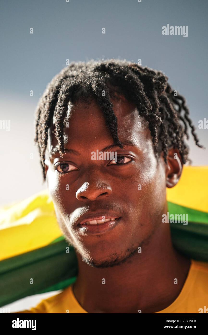 Tajay Gayle with her country's flag after medaling in the long jump at ...