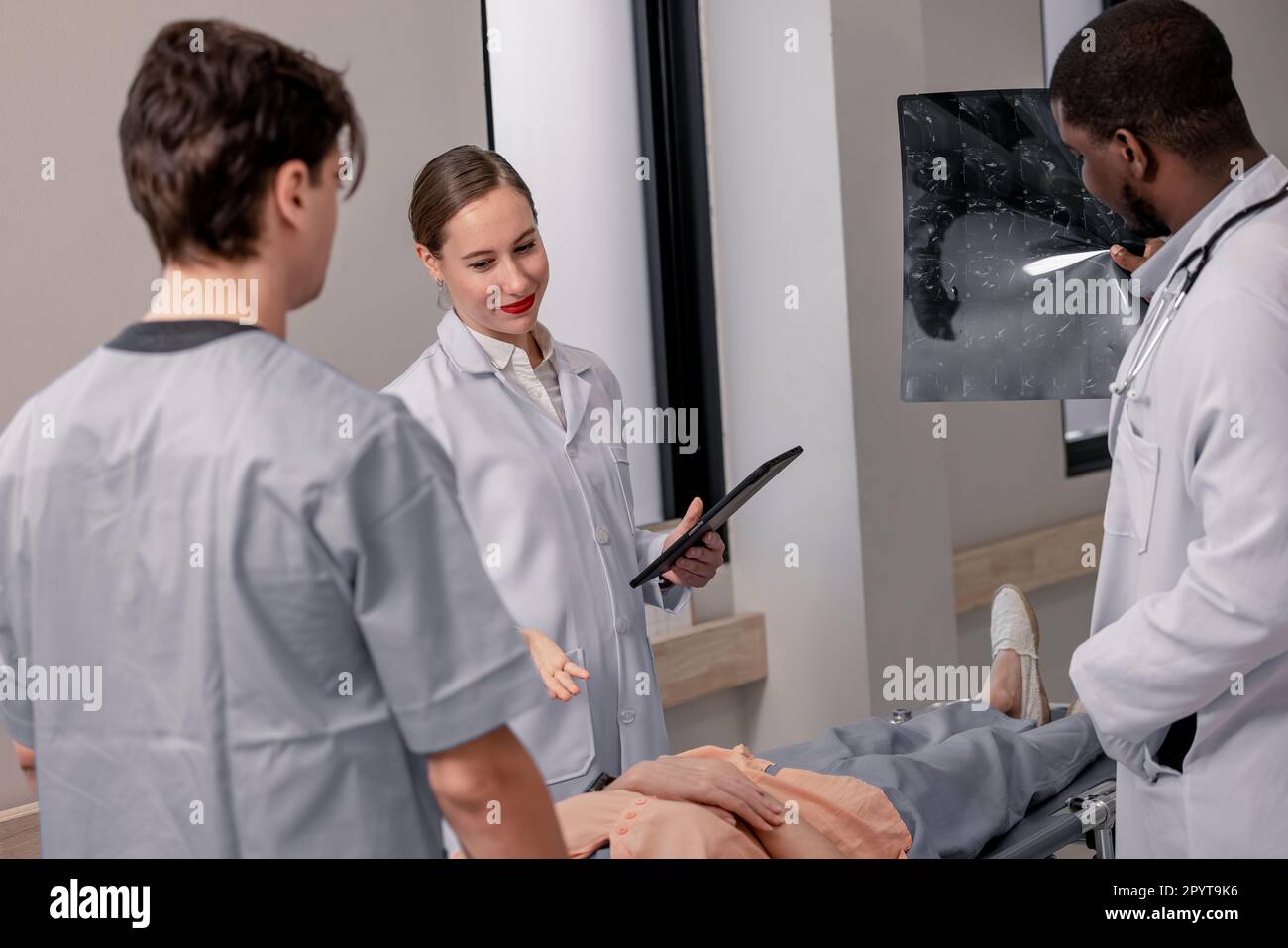 Physician and radiologist analyze medical images, including MRI film ...
