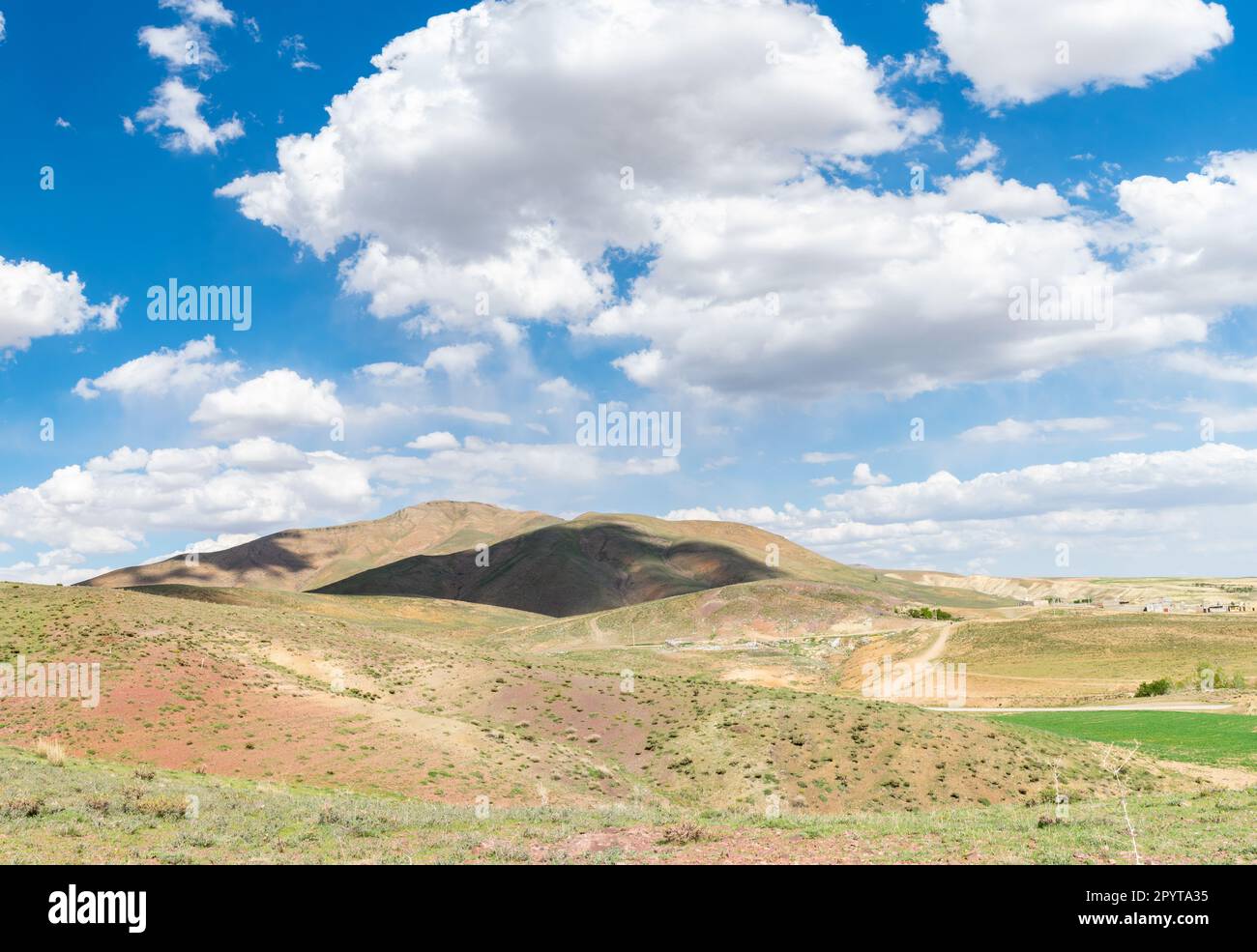 A landscape of nature on a cloudy spring day including mountains and ...