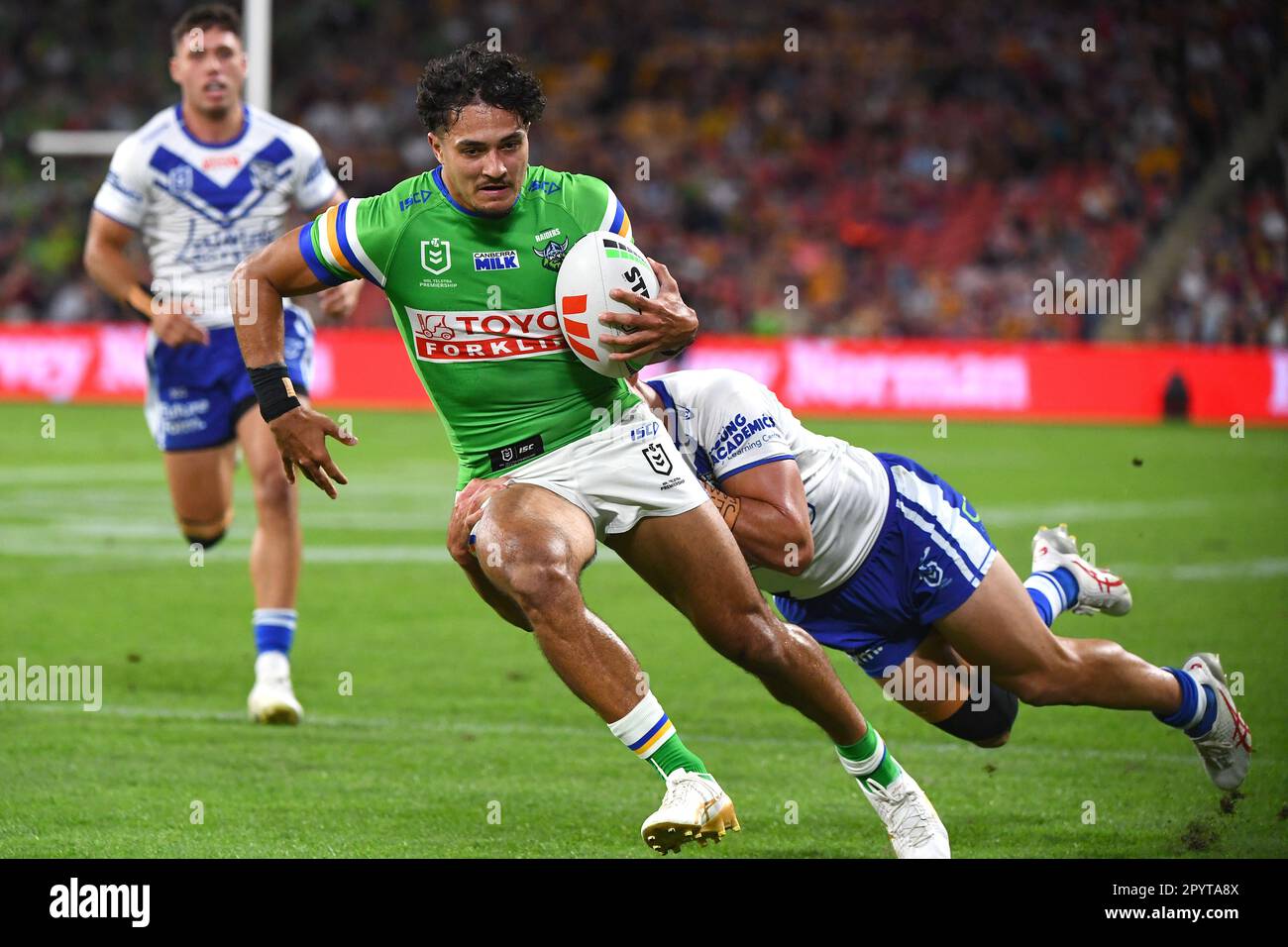 Xavier Savage of the Raiders makes a run during the NRL Round 10 match ...