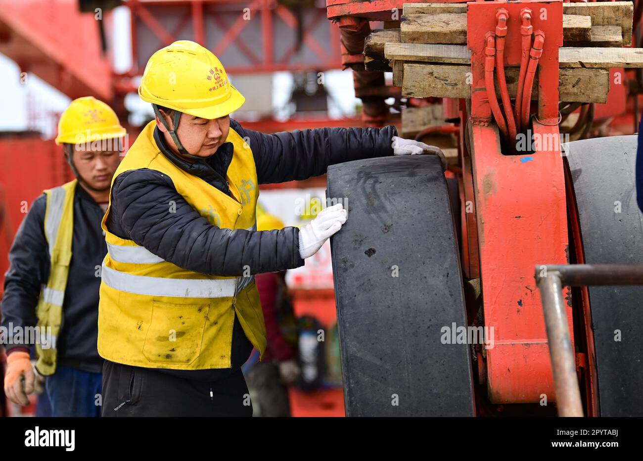 BAOTOU, CHINA - MAY 5, 2023 - Builders work at the box girder erection ...
