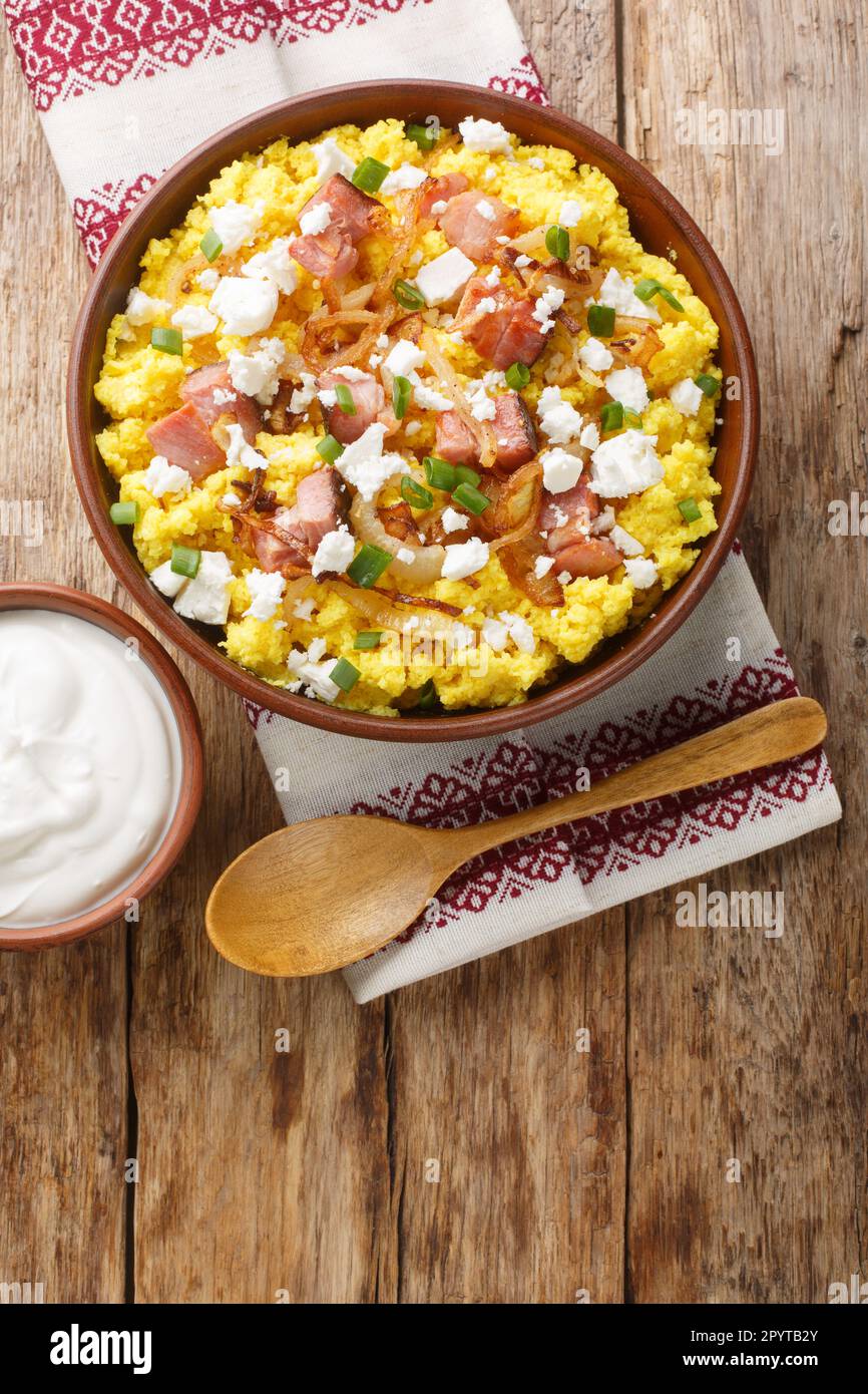 Delicious traditional Ukrainian banosh closeup on the bowl on the ...