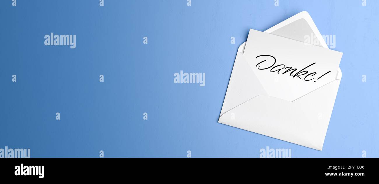 Letter with the German text "Danke" ("Thanks") in an envelope on blue ...