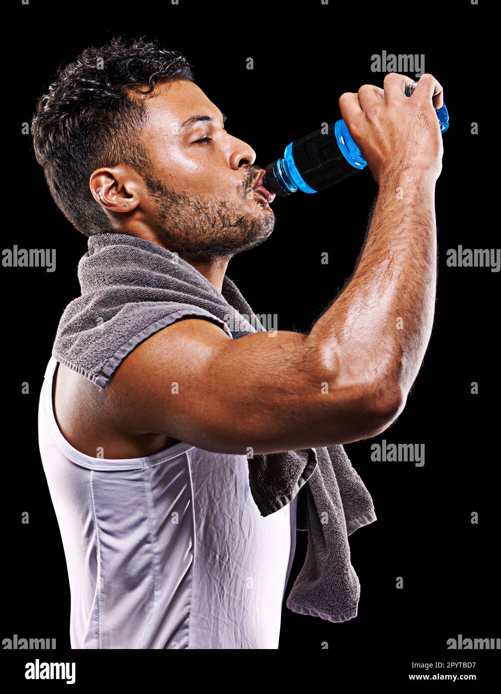 Handsome young sportsman standing drinking hi-res stock photography and ...