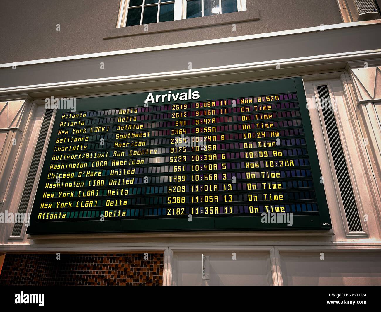 The airplane arrivals schedule displayed on the screen at the airport ...