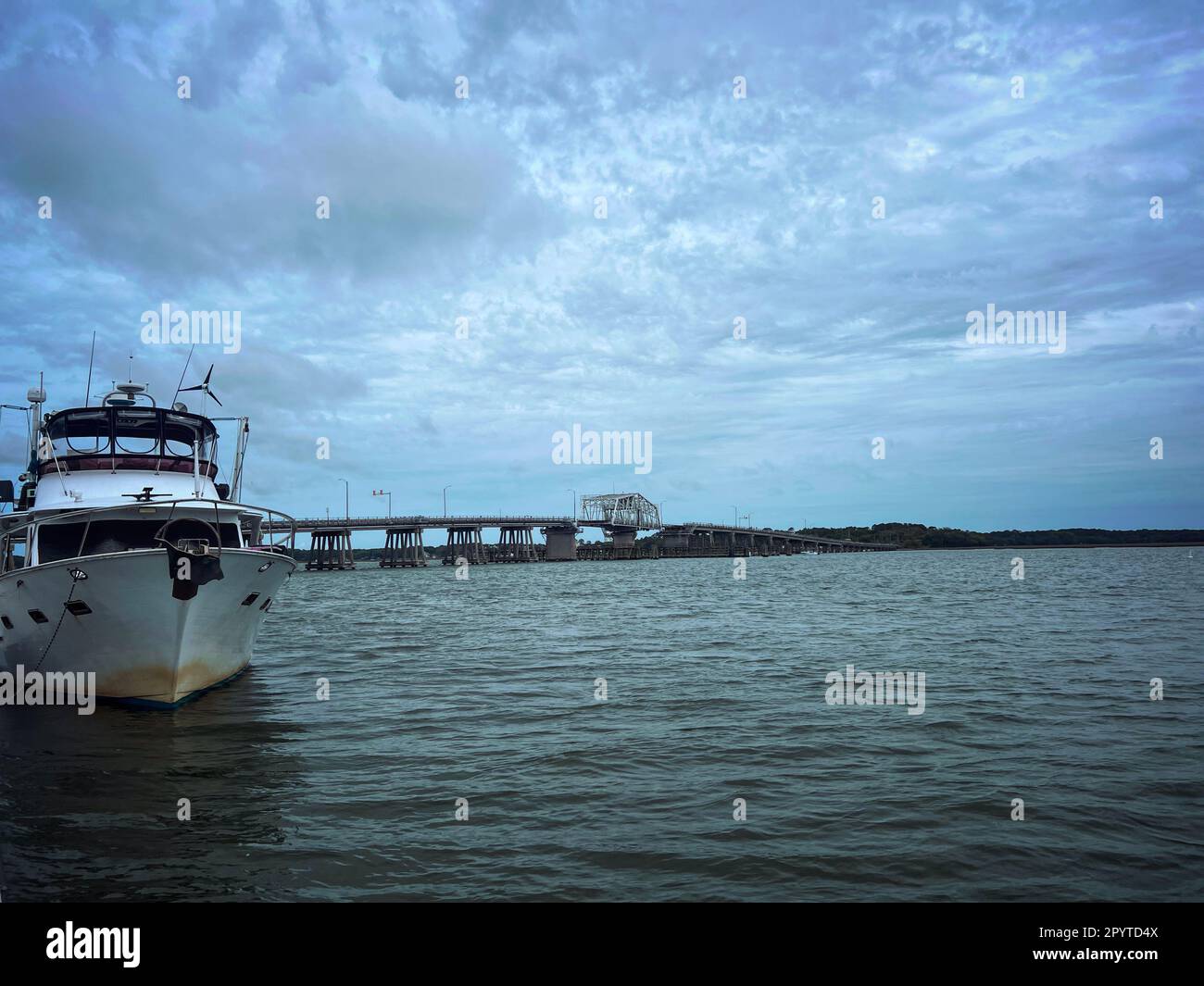 A docked boat with a drawbridge in the background. Beaufort, South ...