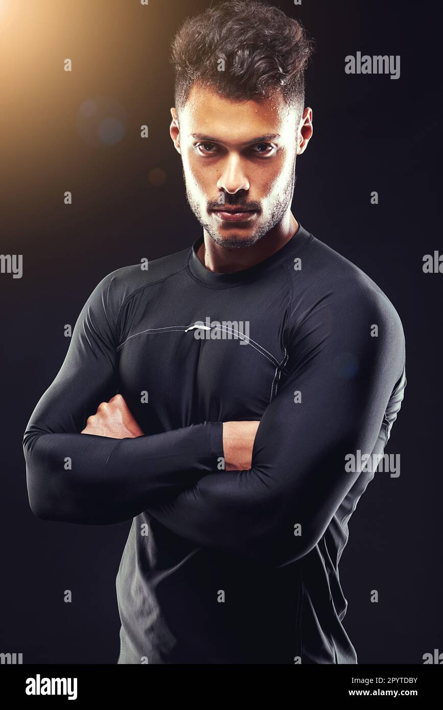 Hes an unstoppable force. Studio shot of a fit young man isolated on ...