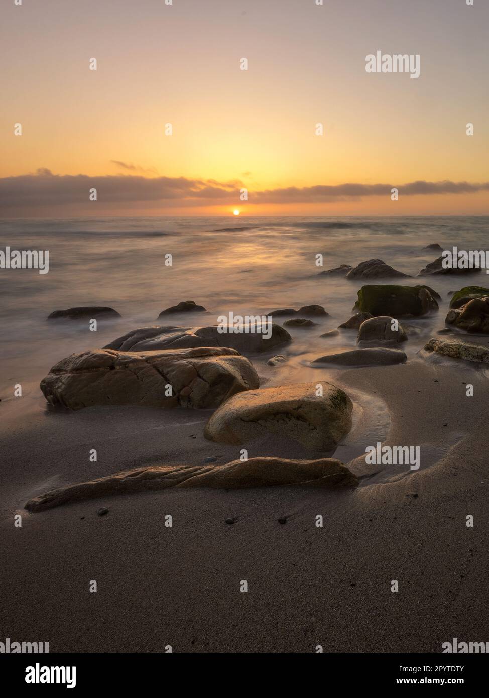Calm and peaceful sunset on the Galician beaches Stock Photo - Alamy