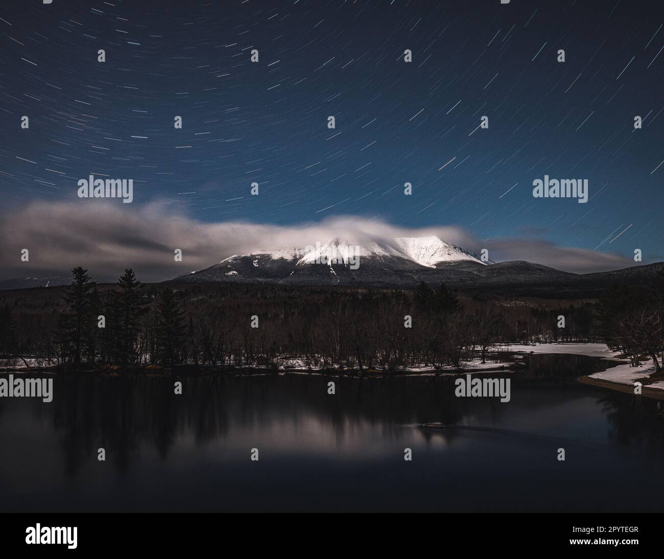 Katahdin in winter at night long exposure with stars, Maine Stock Photo ...
