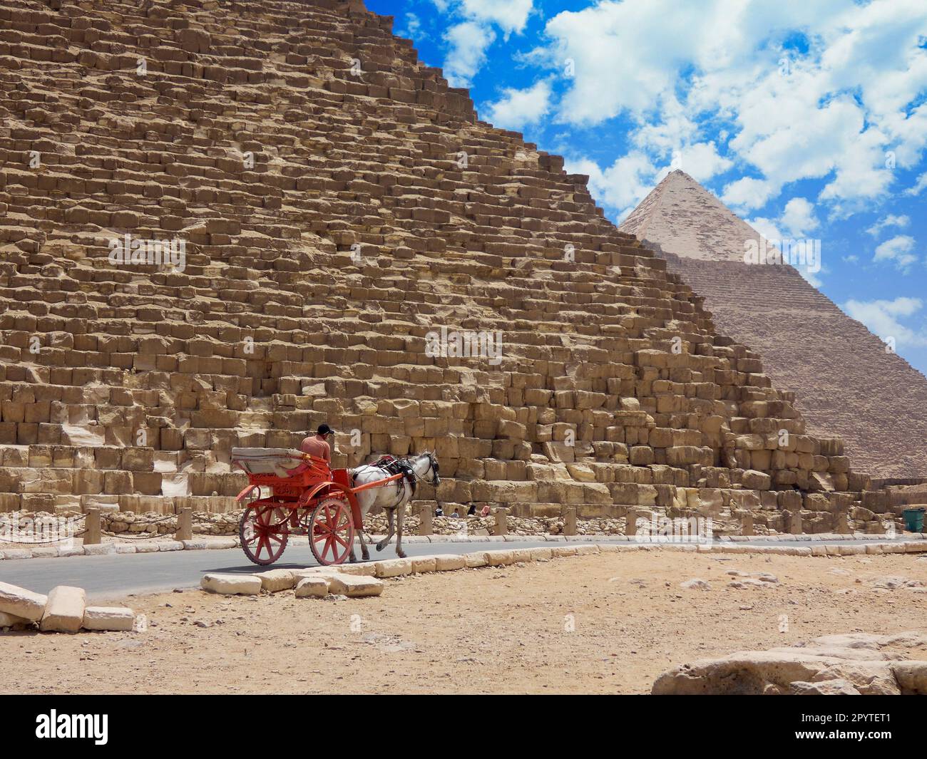 Egyptian pyramids in sand desert and clear sky Stock Photo - Alamy