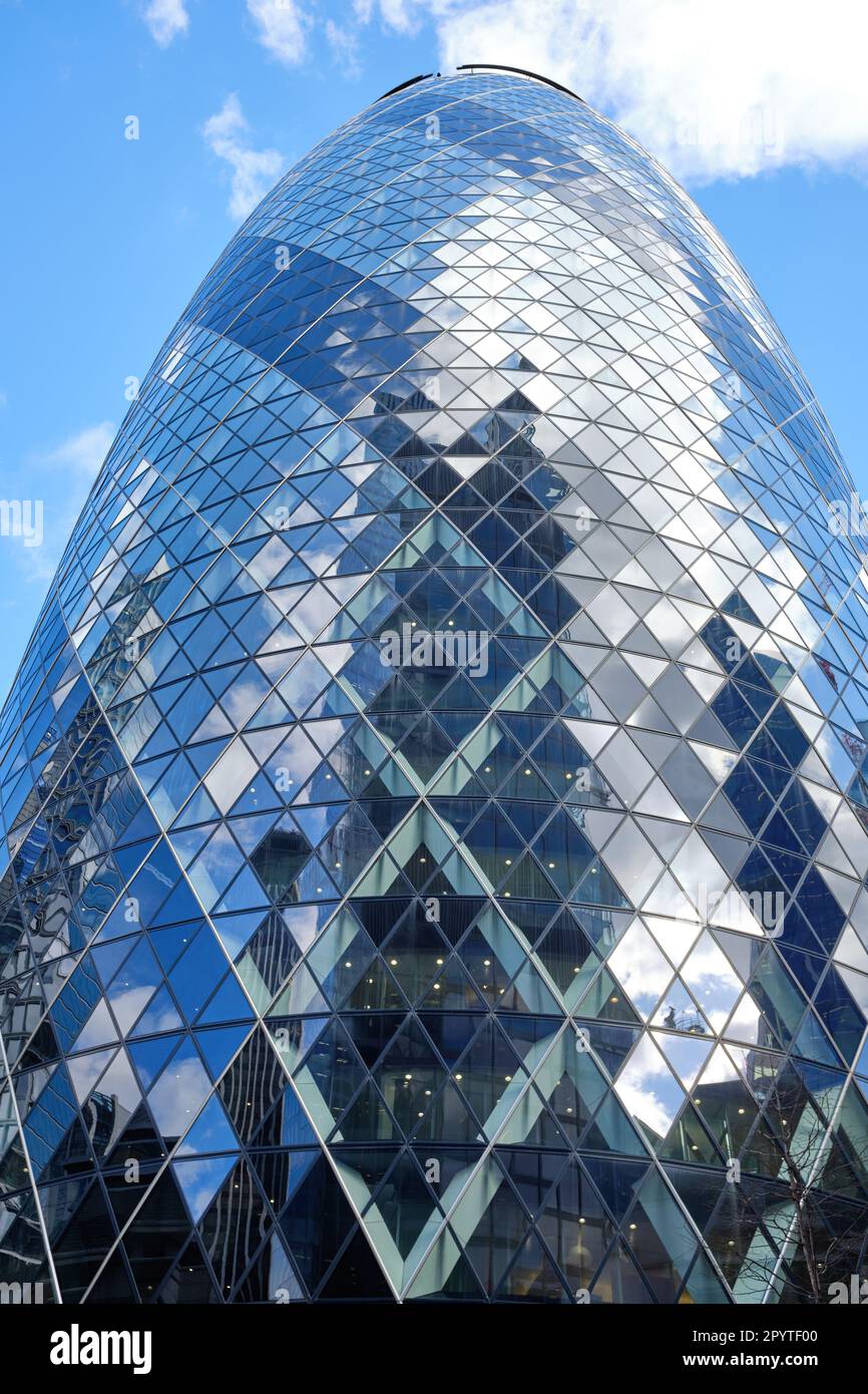 Norman Foster 's GHERKIN building 30 St Mary Axe rising behind St ...