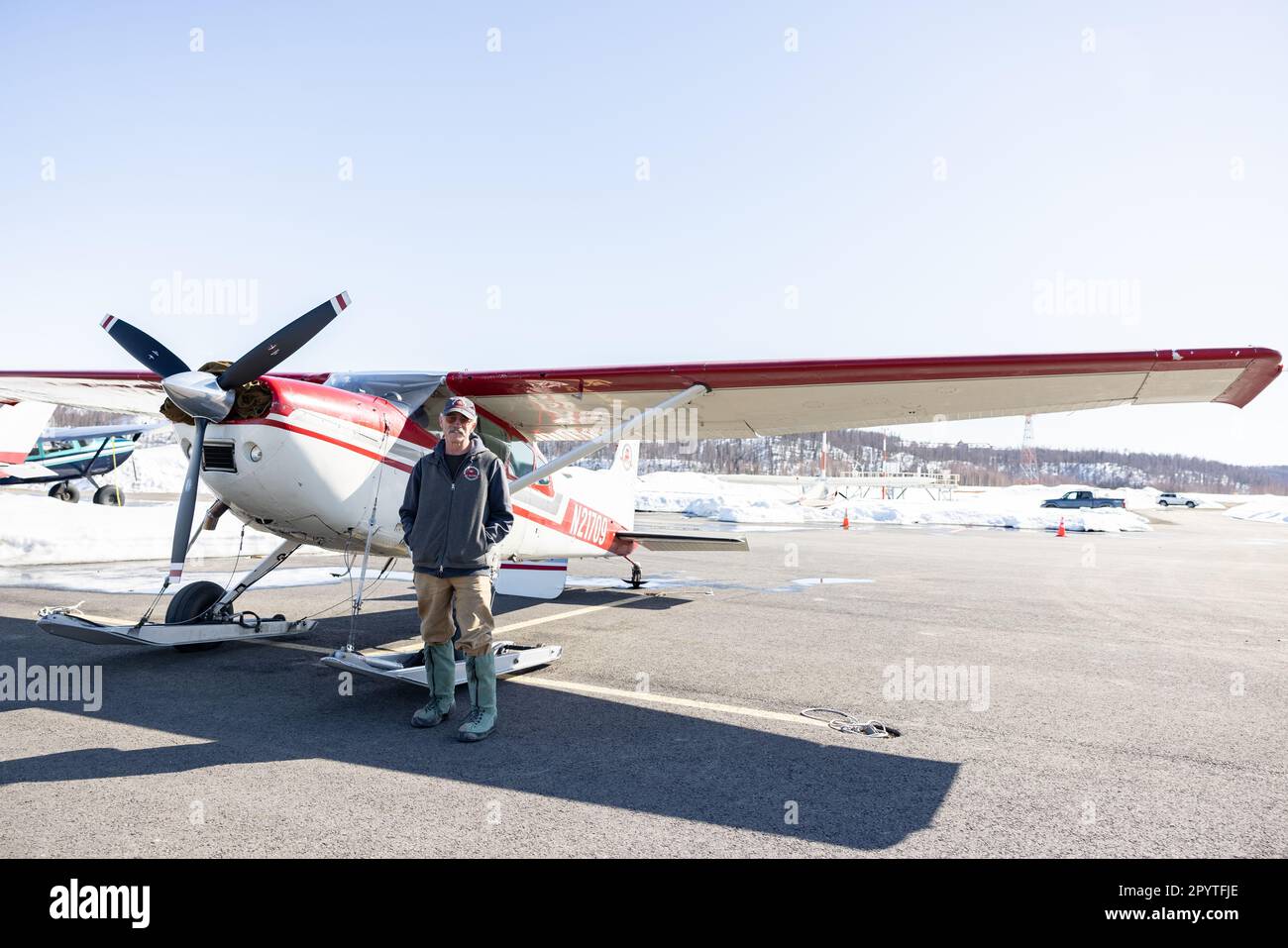 Portrait of pilot on snowy runway in Talkeetna, Alaska Stock Photo - Alamy