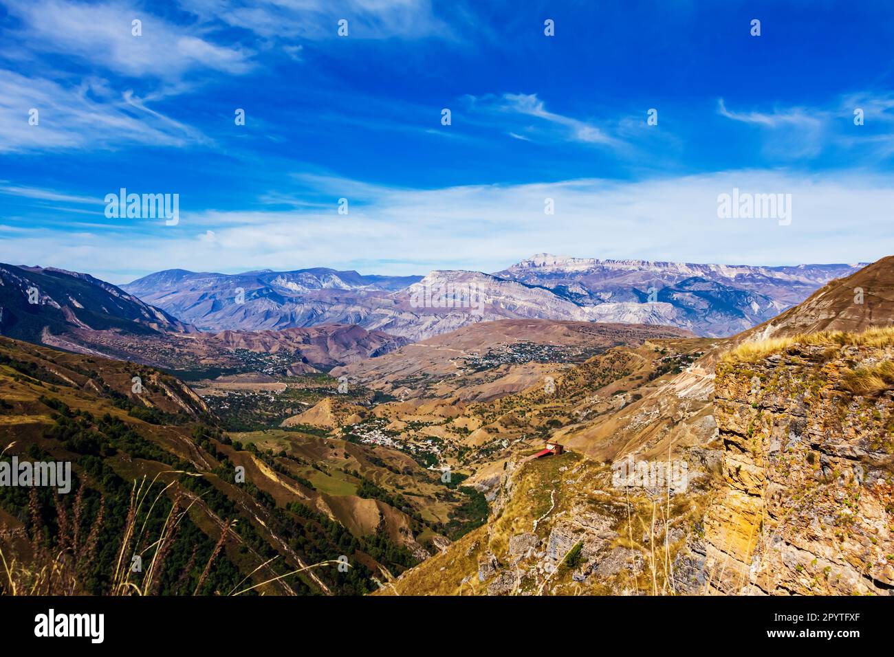 Gorgeous mountain landscape on a sunny day. View of the Caucasus Range ...