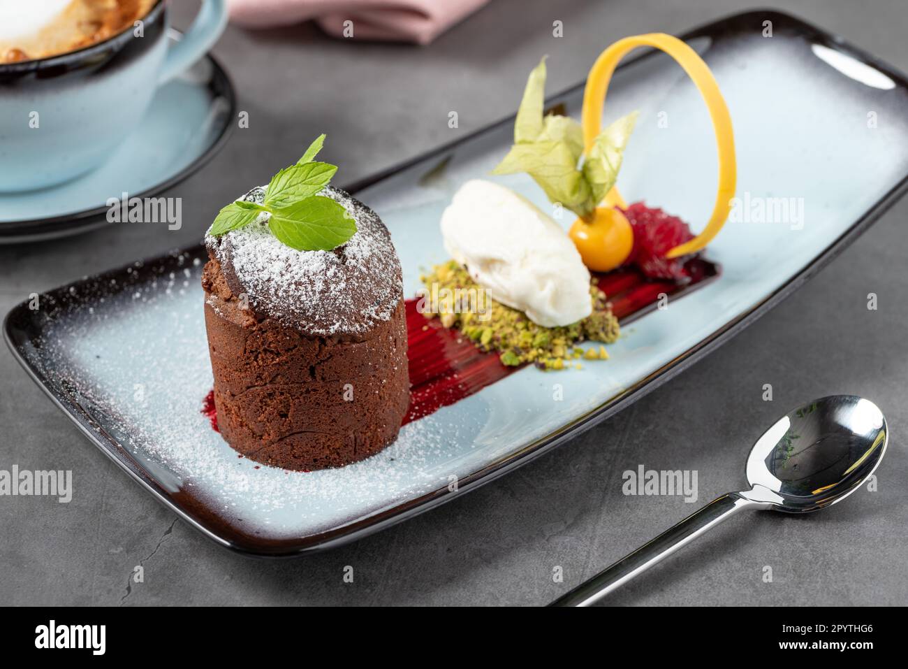 Chocolate souffle with ice cream served in a fine dining restaurant ...