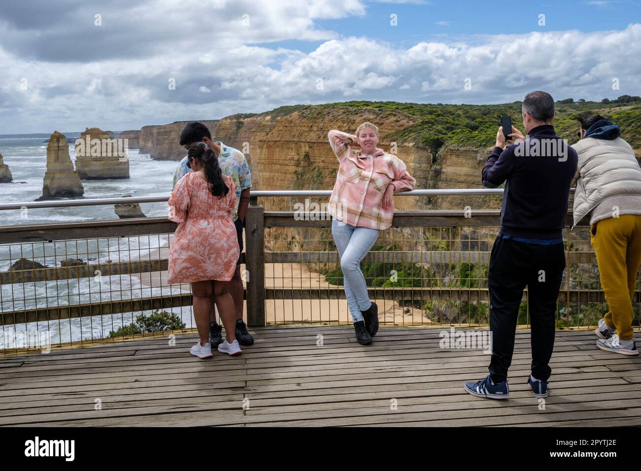 Tourists taking photos at the Twelve Apostles, Port Campbell National ...