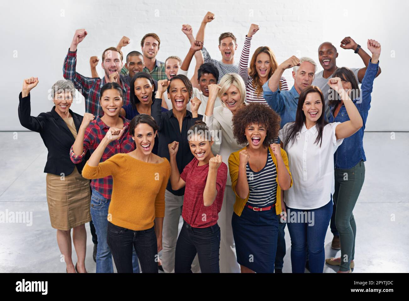 Success, portrait and group of people fist with power, celebration and ...