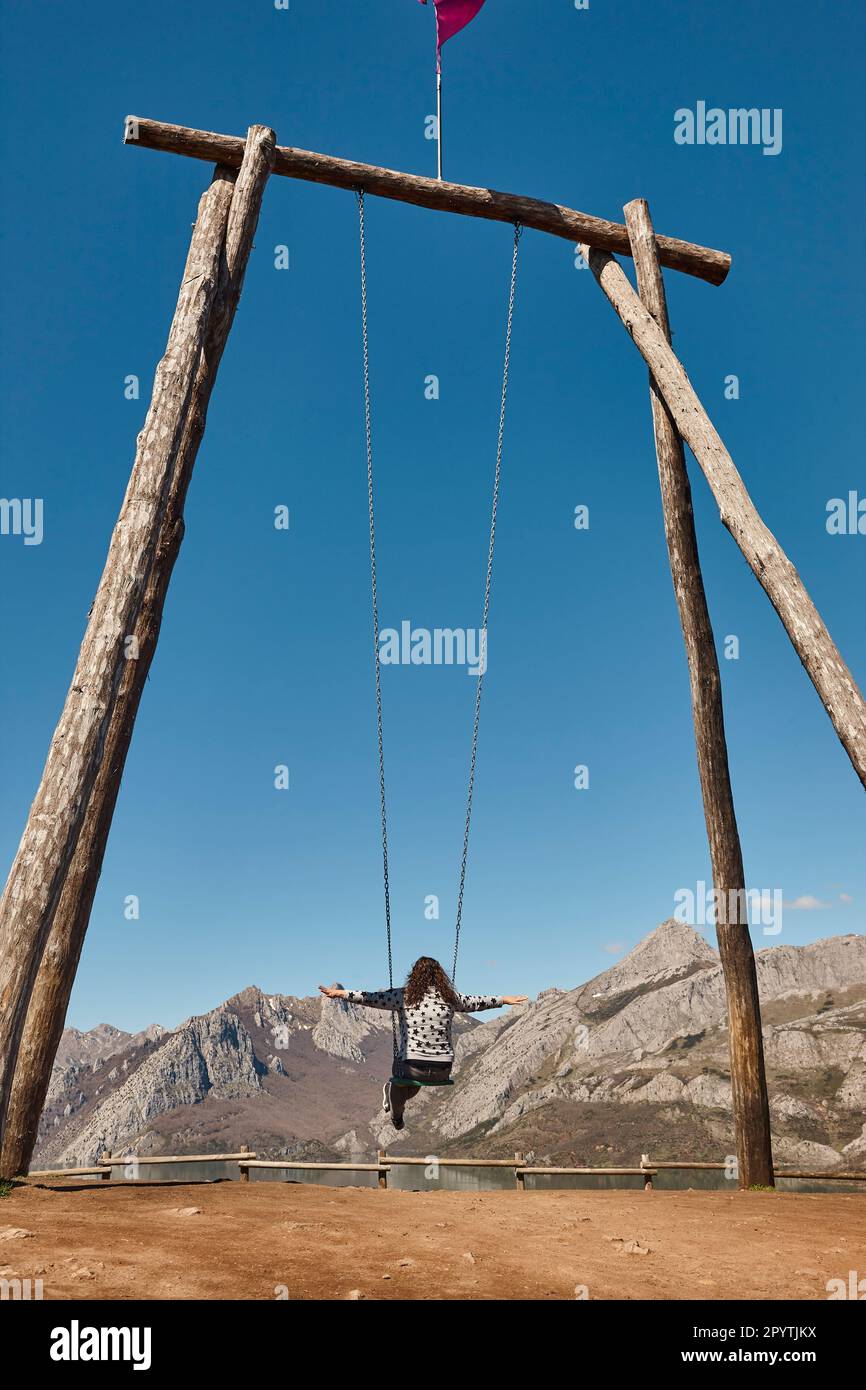 Huge swing surrounded by mountains in Riano village. Spain Stock Photo ...