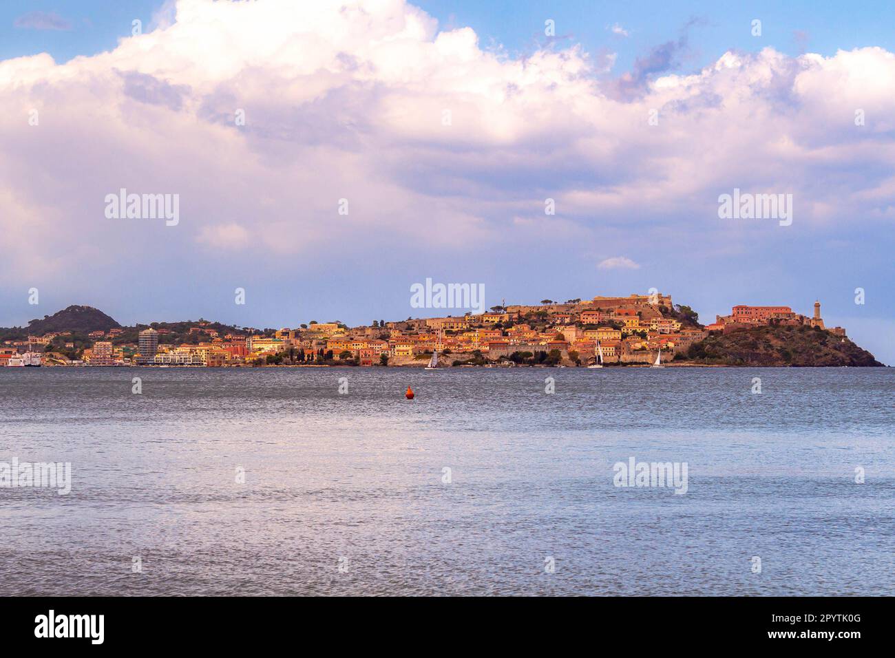 View from Magazzini Beach to the skyline of Portoferraio, Elba island ...
