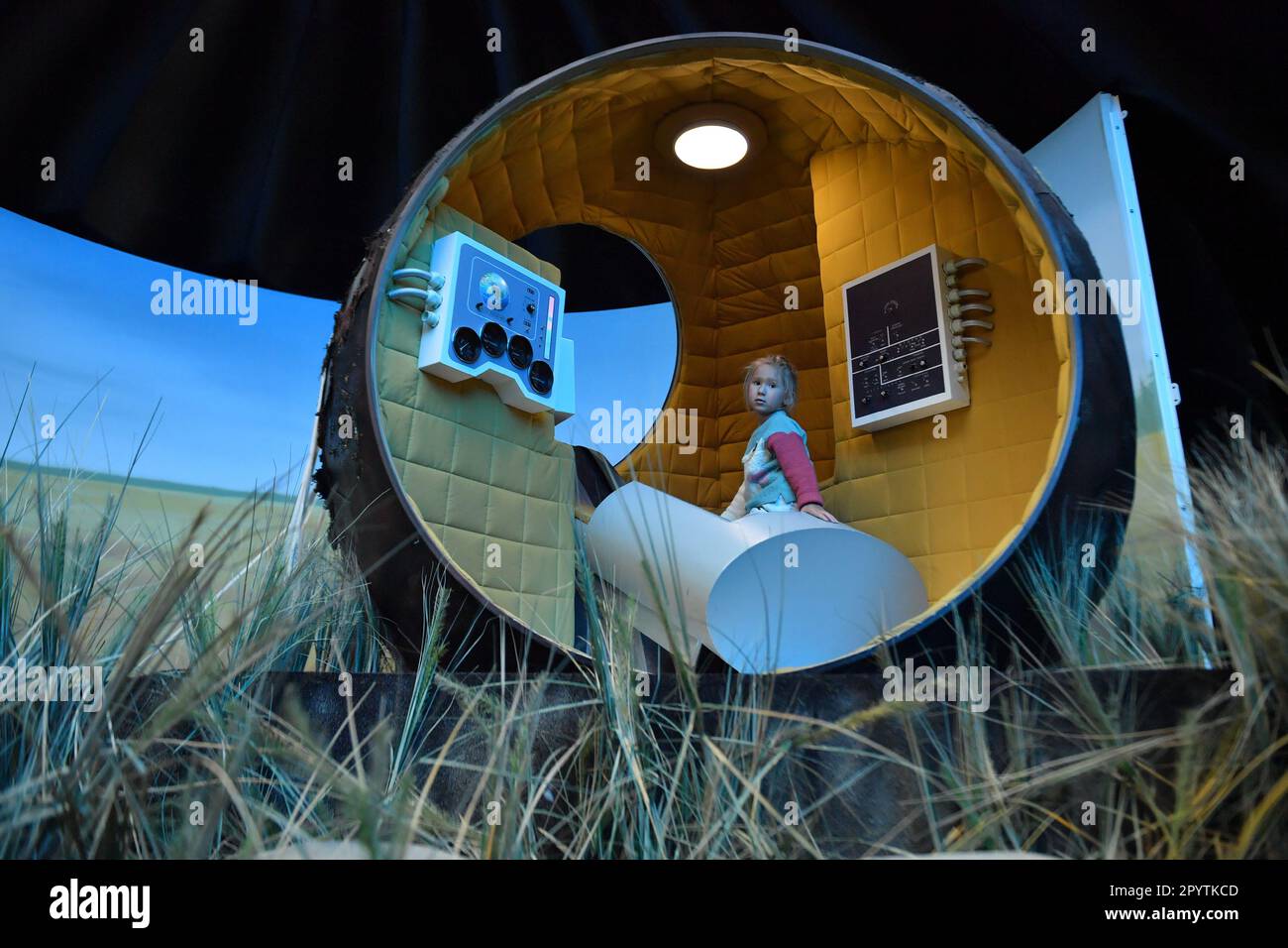 Moscow. A child in the Gagarin Capsule photo zone at the Cosmonautics and Aviation Center at ...