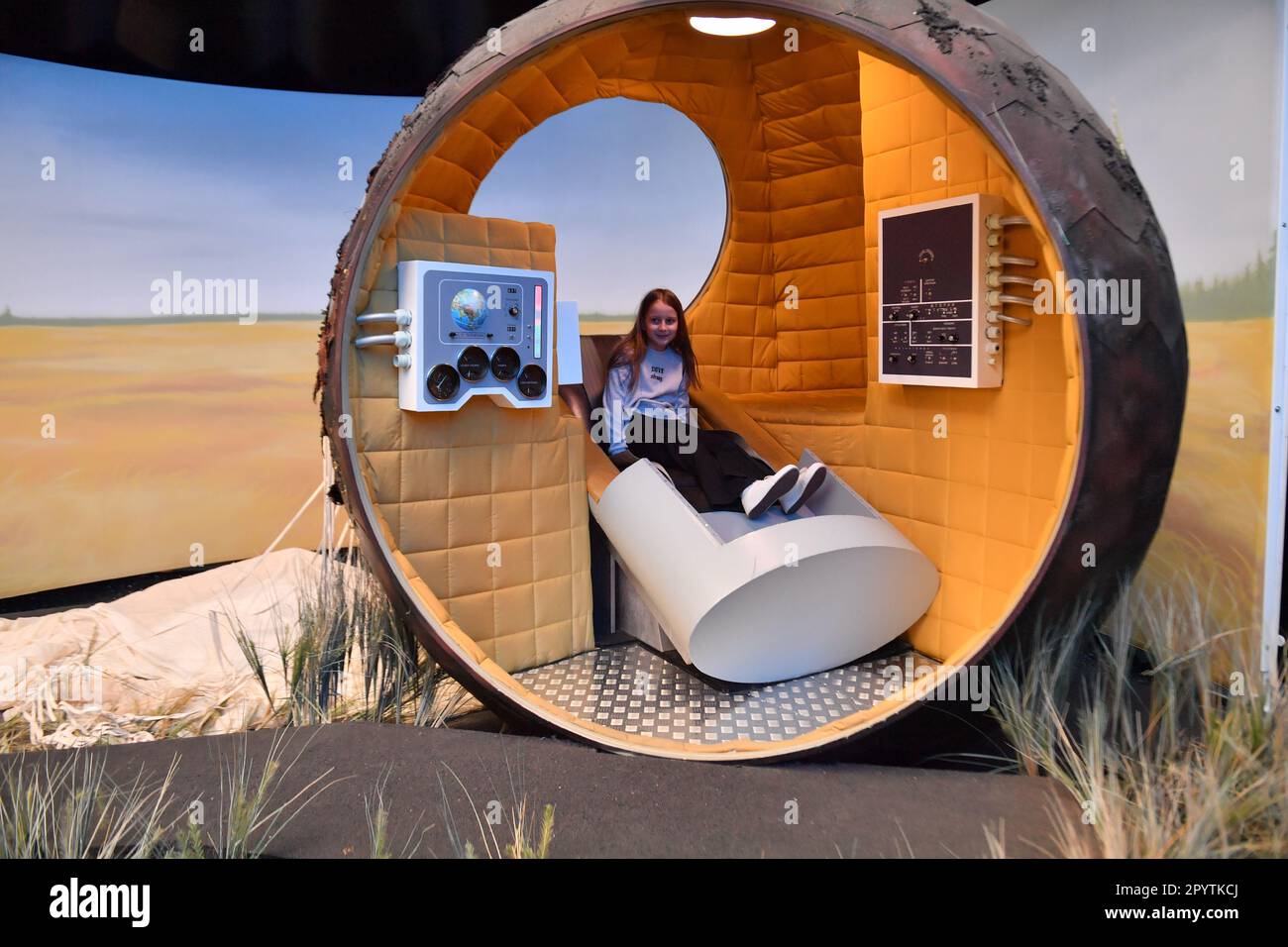 Moscow. A child in the Gagarin Capsule photo zone at the Cosmonautics ...